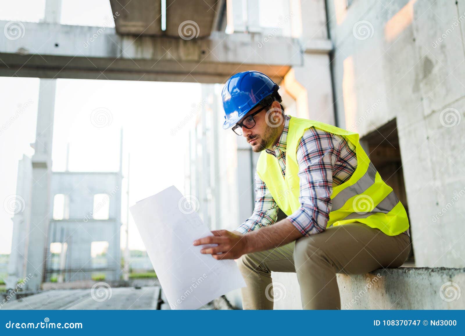 Picture of Construction Site Engineer Looking at Plan Stock Image ...