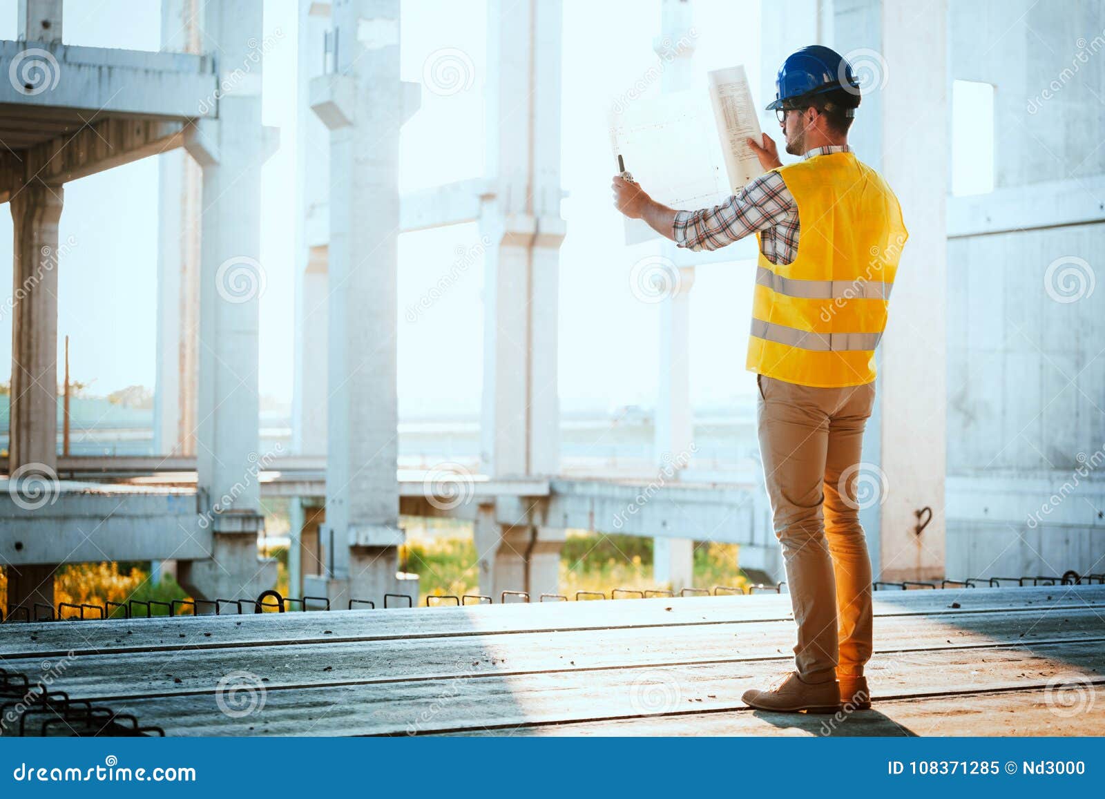 Picture of Construction Site Engineer Looking at Plan Stock Image ...
