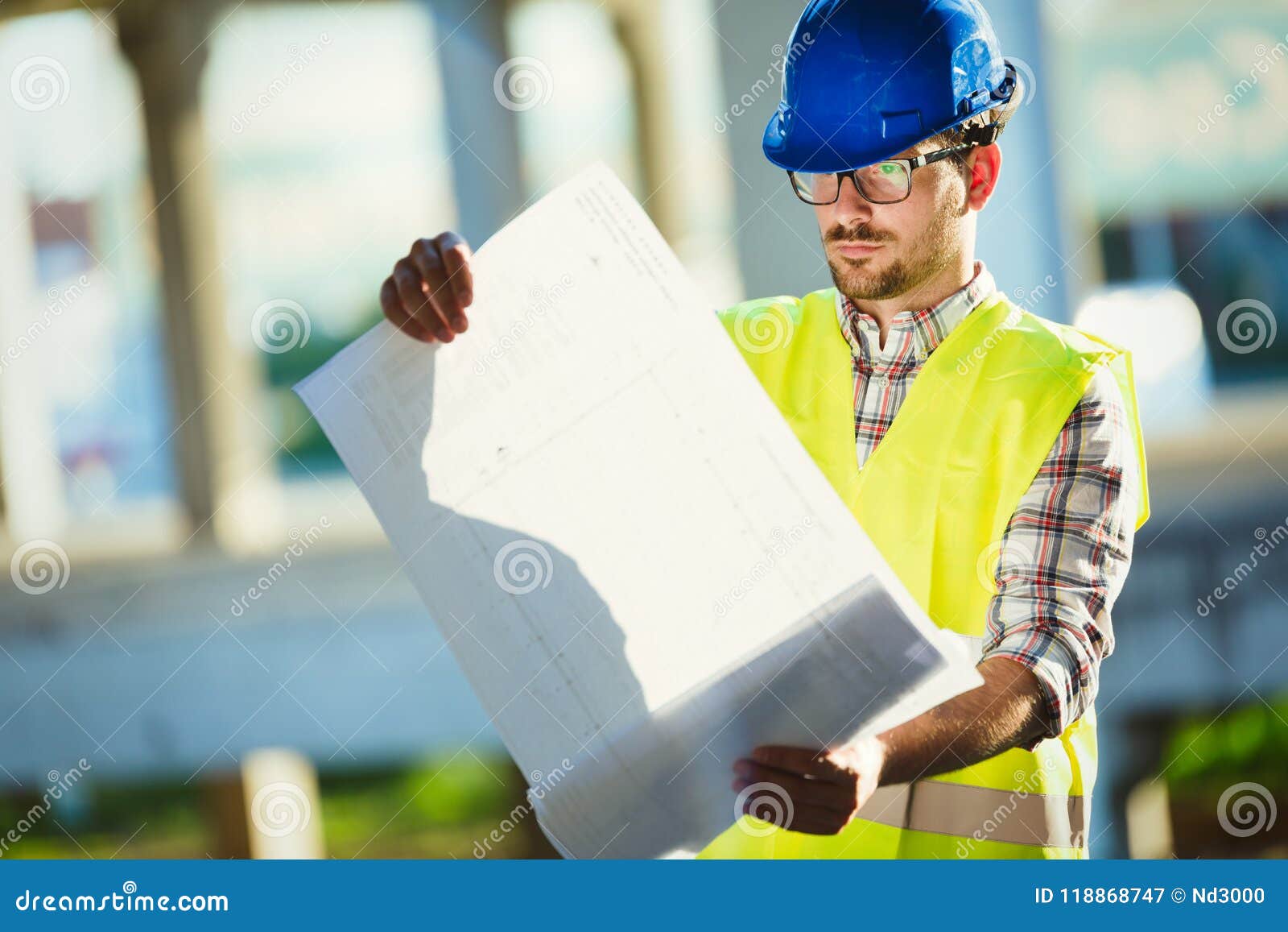 Picture of Construction Site Engineer Looking at Plan Stock Image ...