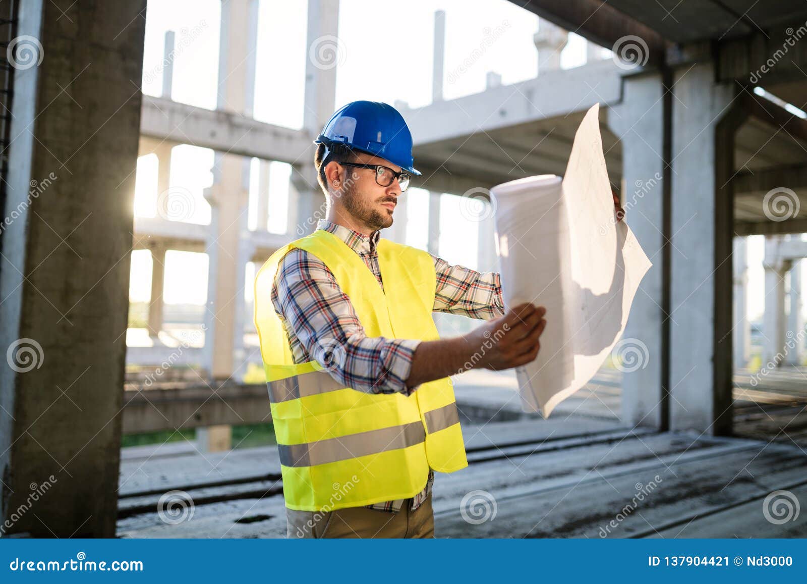 Picture of Construction Site Engineer Looking at Plan Stock Image ...