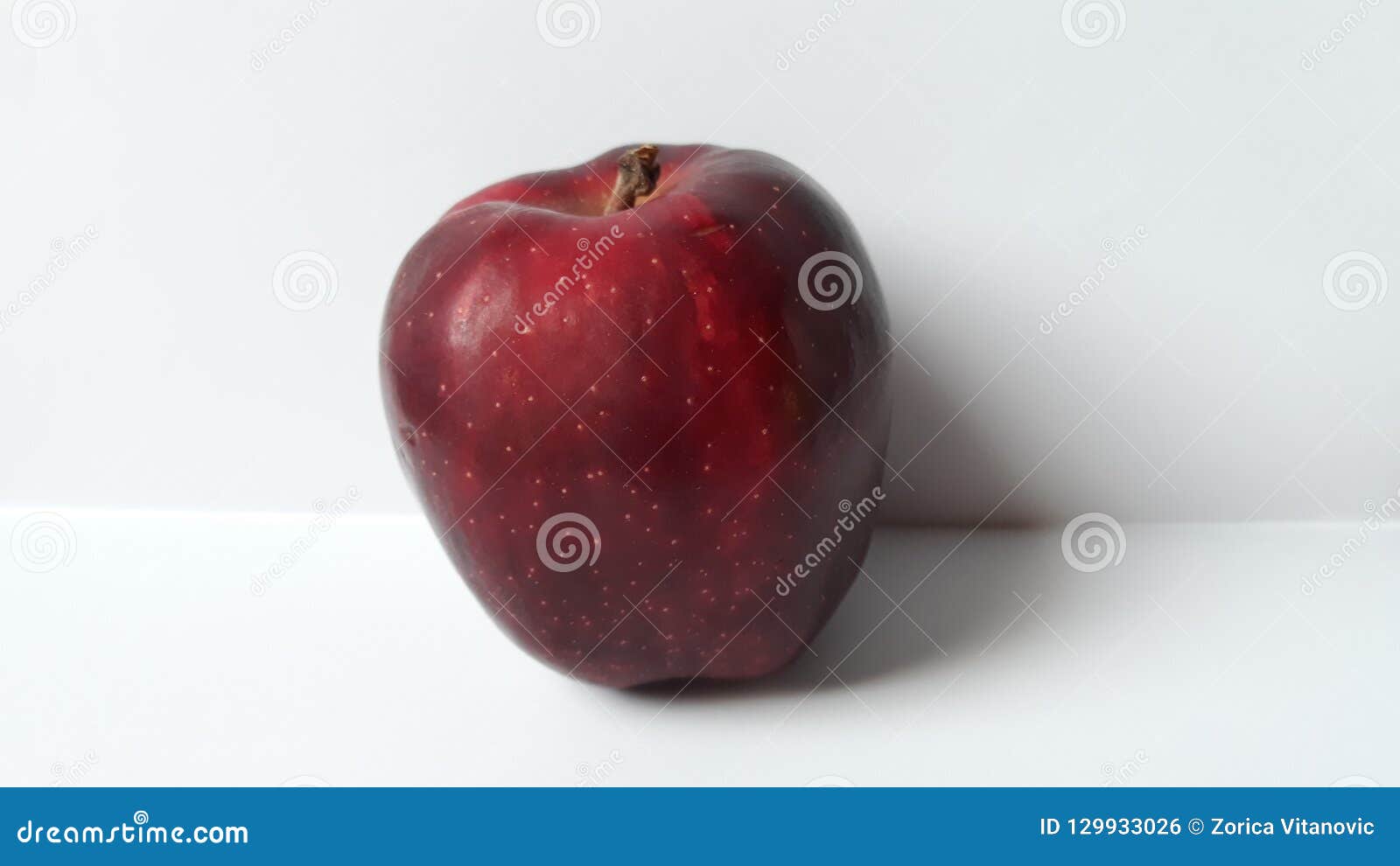 Dark red apple stock photo. Image of apple, white, dark - 129933026