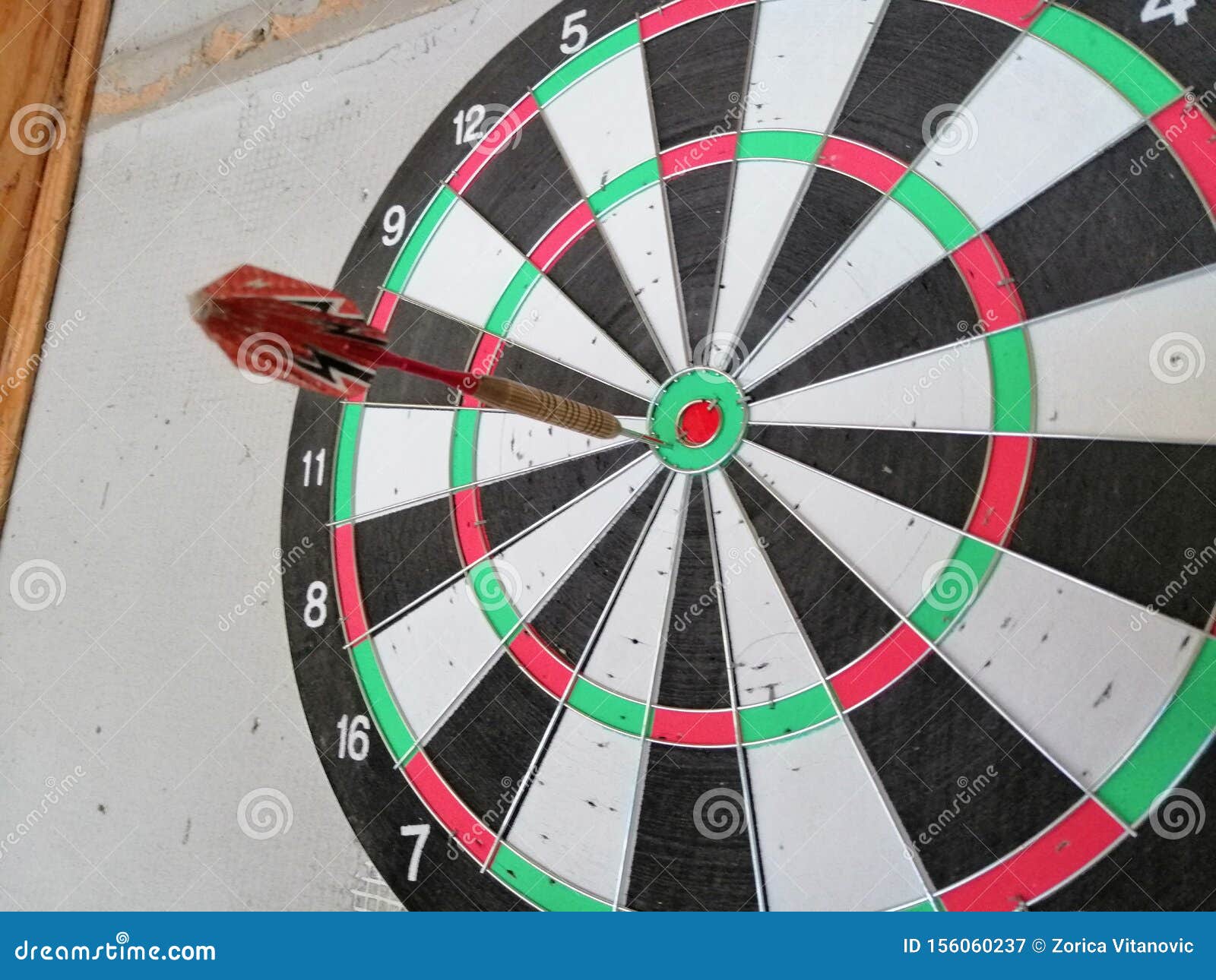Dart board hit in middle stock image. Image of board - 156060237 Dart board hit in middle stock image. Image of board - 156060237