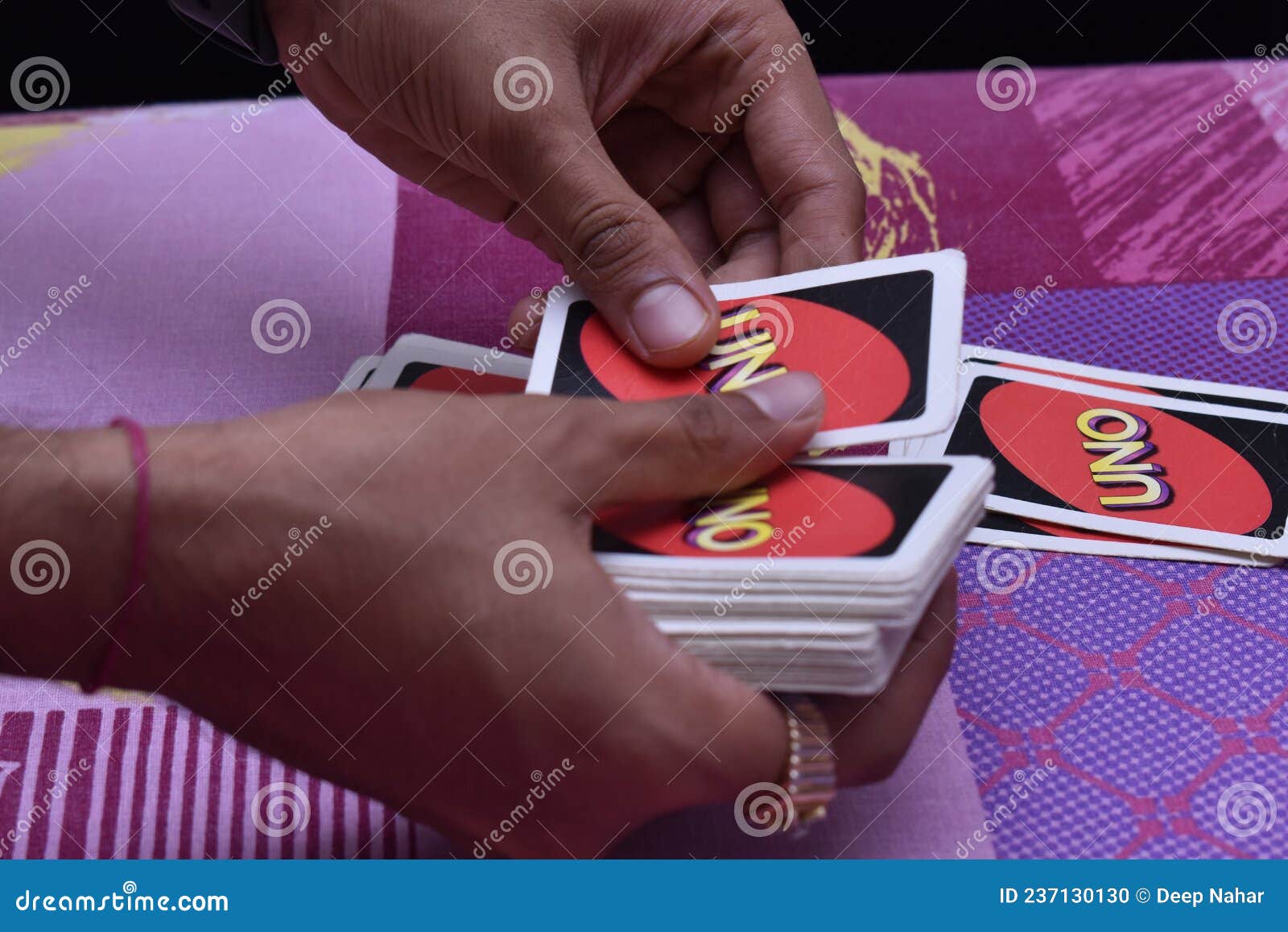 Picture of Distributing Uno Cards with Hand and Fingers Editorial Image ...