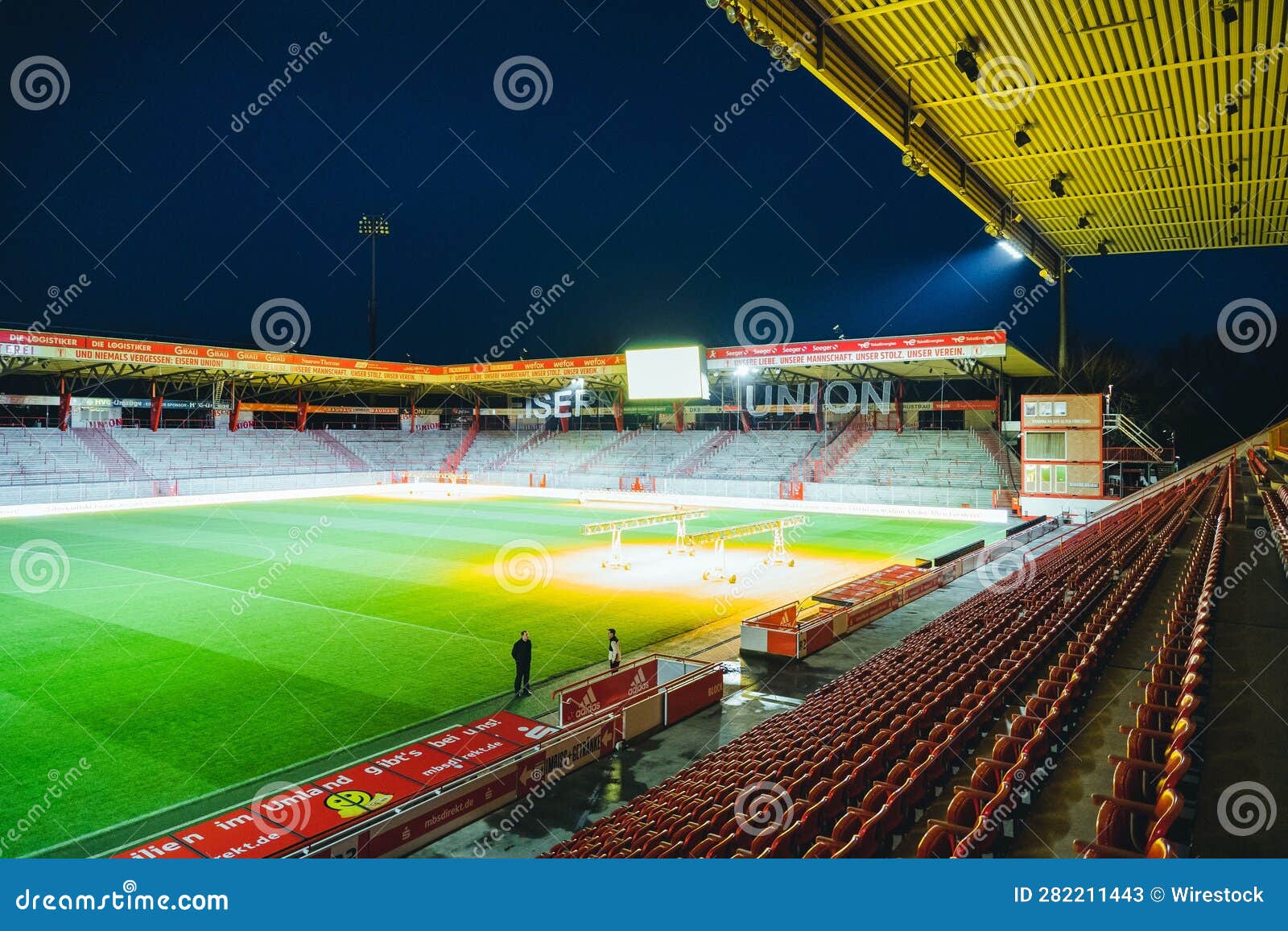 Picture of an Empty Stadium at Night, Illuminated in a Dim Light in ...
