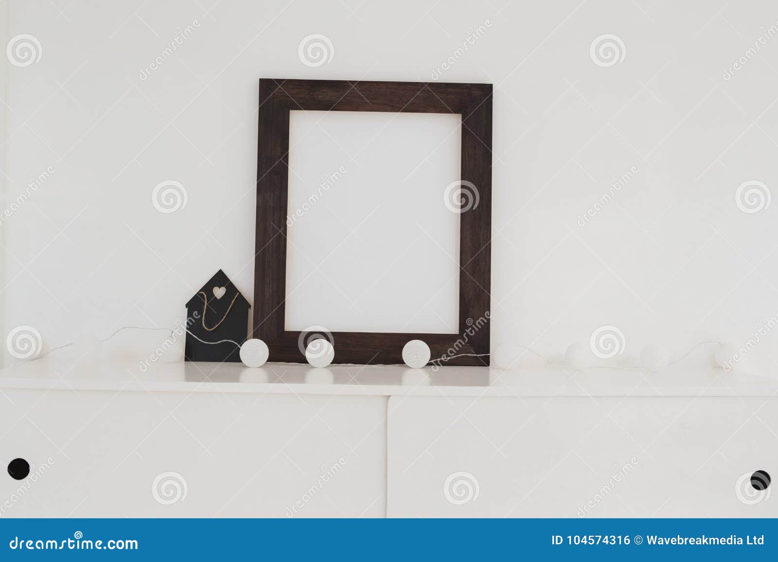 Picture Frame with Decorations on Table Stock Photo - Image of white ...
