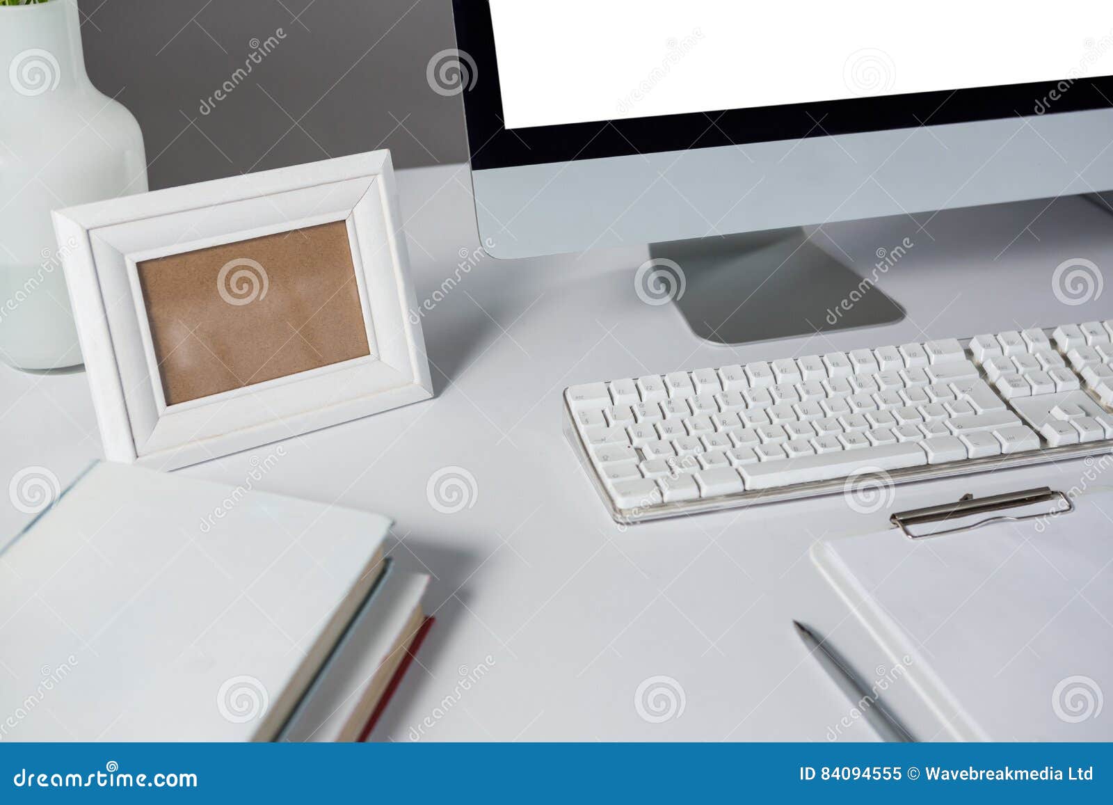 Picture Frame, Desktop Pc and Books on Table Stock Image - Image of ...
