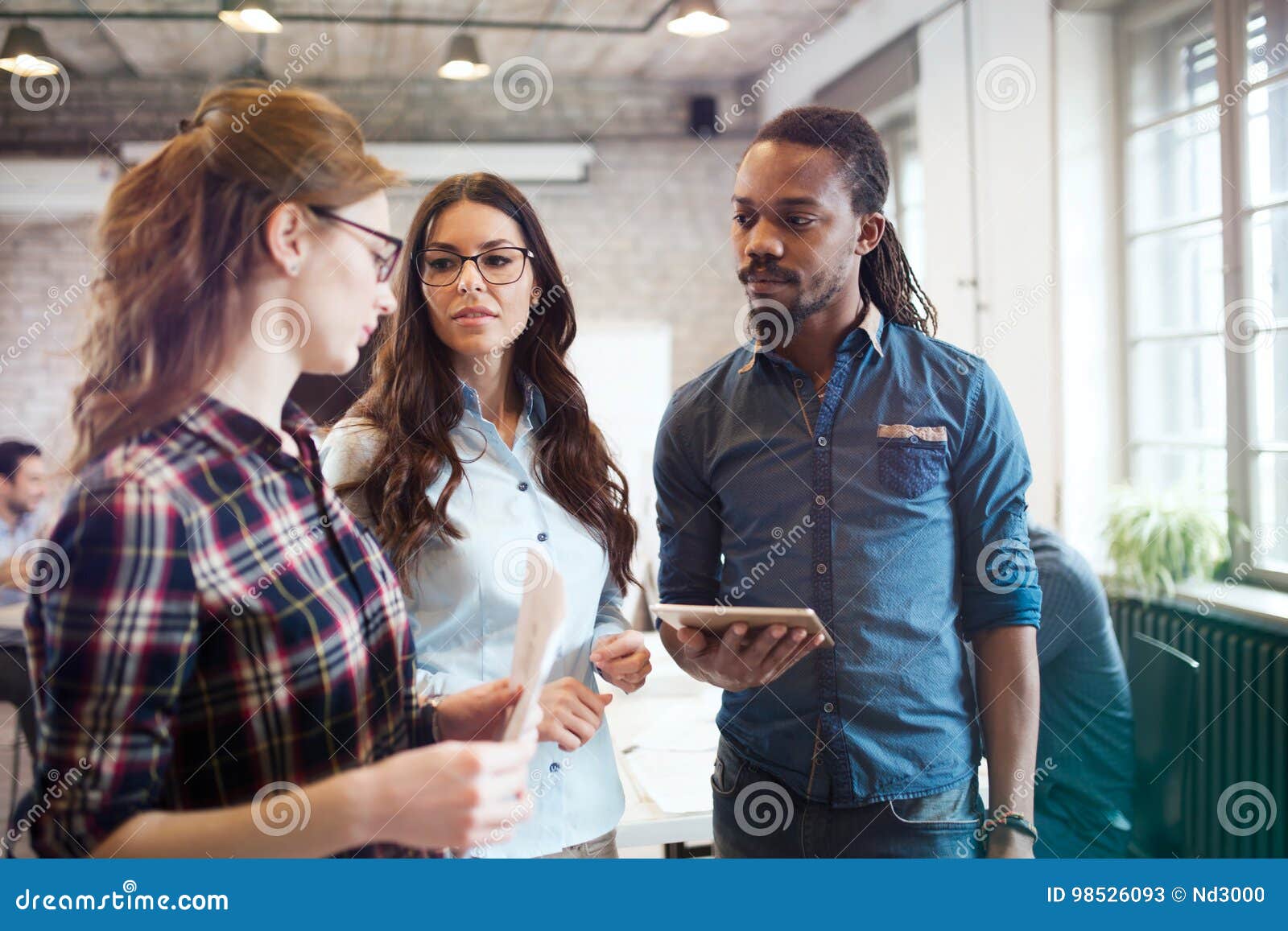 Picture of Group of Young Perspective Designers Discussing Stock Image ...