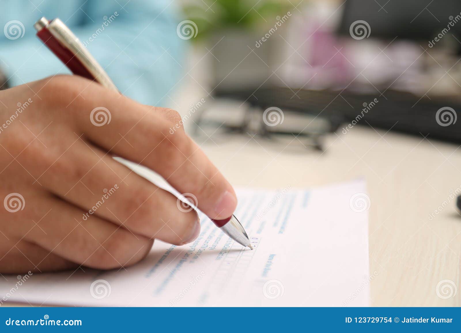 Picture of Hand is Filling Form with Pen Stock Photo - Image of flower ...