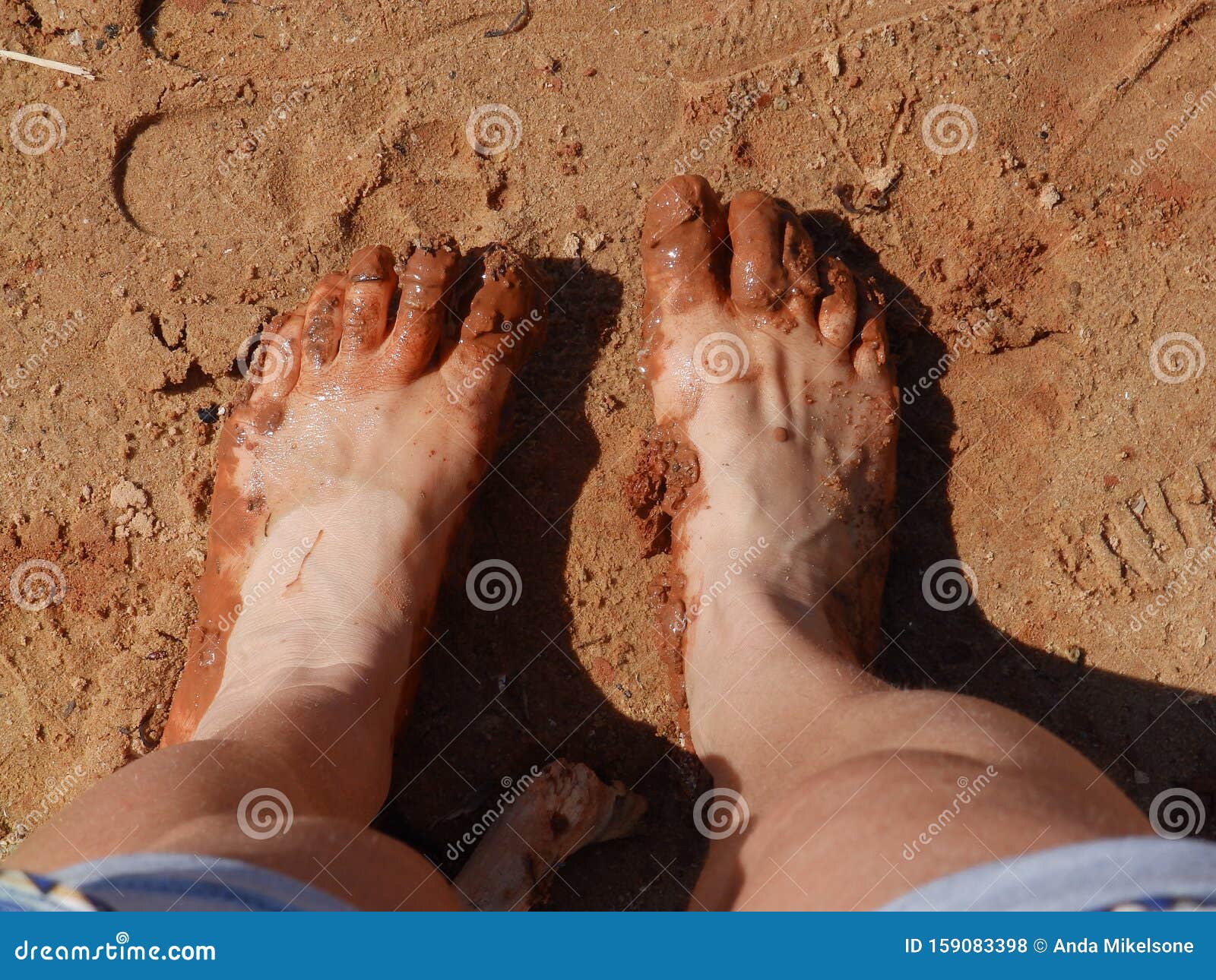 Picture of Human Feet in Red Mud Stock Photo - Image of beautiful, clay ...