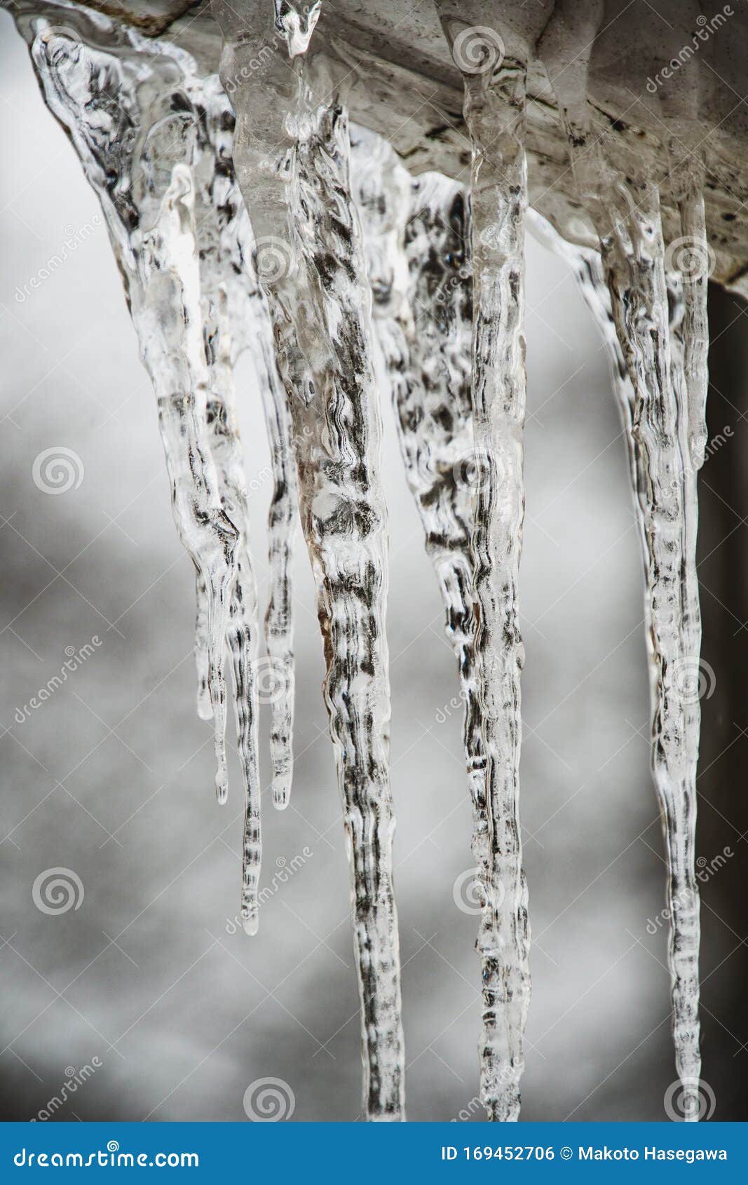 A Picture of Icicles Hanging Down from a Structure Outdoor. Stock Photo ...