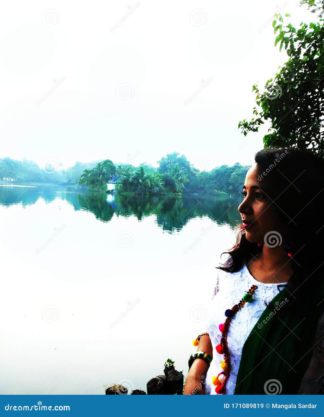 This is a Picture of Lack,and There is a Girl Standing by the Lack ...