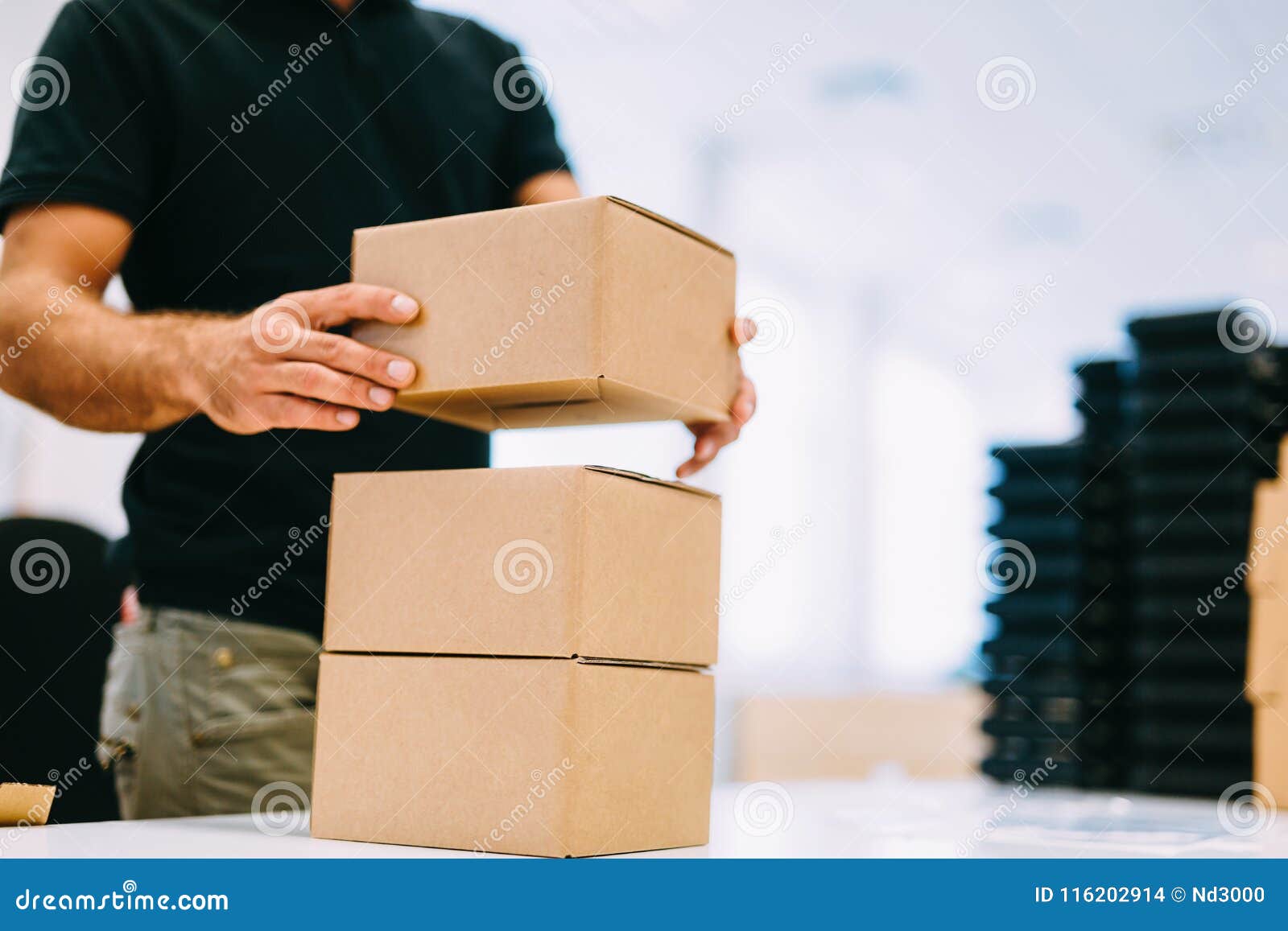 Picture of Man Boxing Products for Dispatching Stock Photo - Image of ...