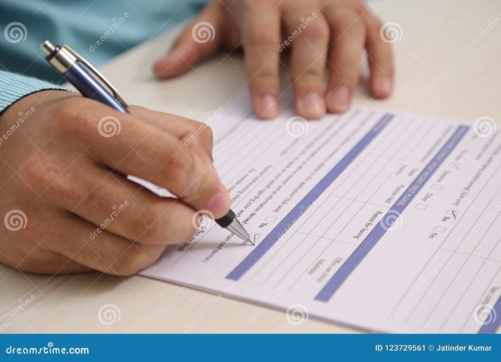 Picture of Man Hand is Filling Form with Pen Stock Image - Image of ...