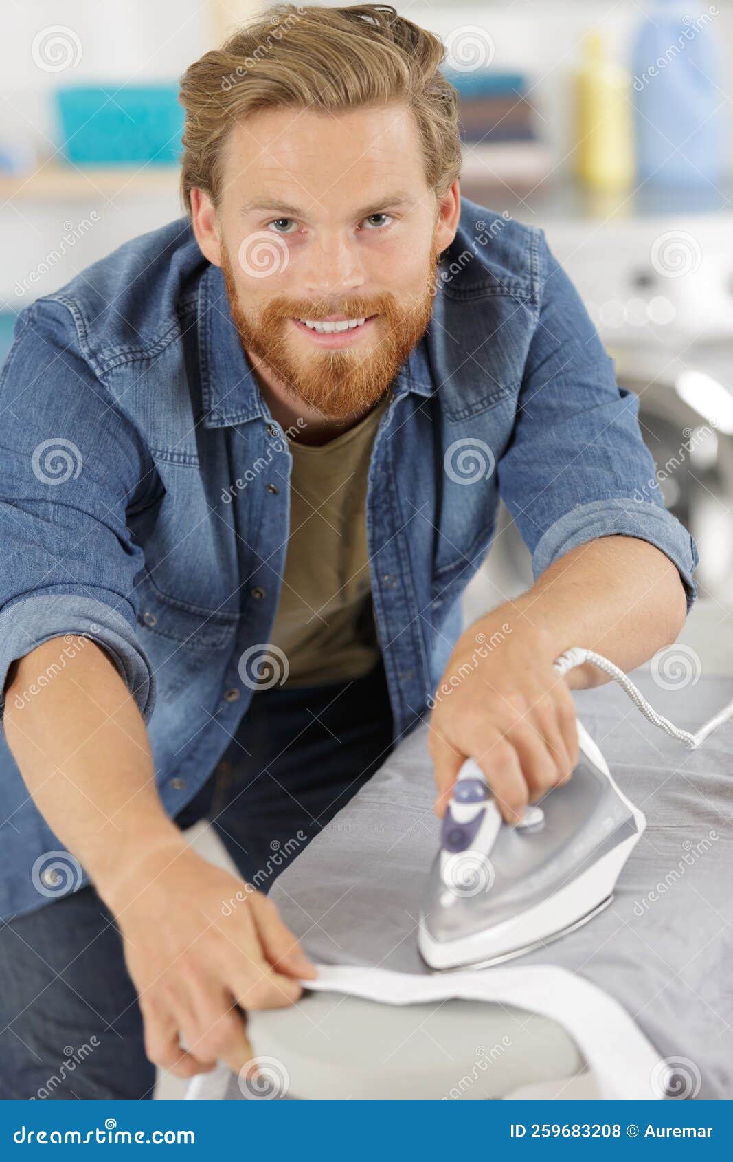 Picture of man ironing stock photo. Image of busy, hardworking - 259683208