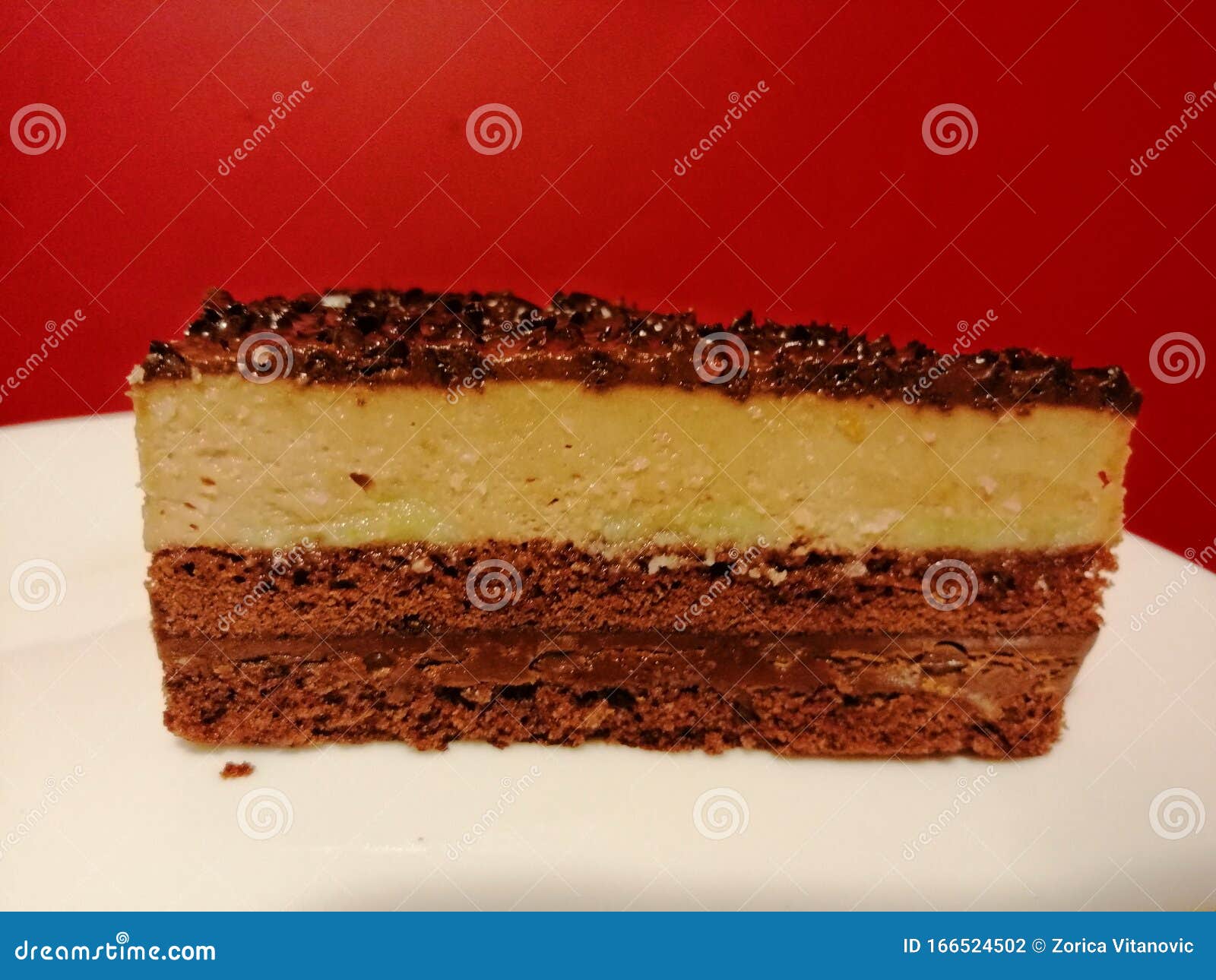 Mozart triangle cake stock photo. Image of fruit, triangle - 166524502