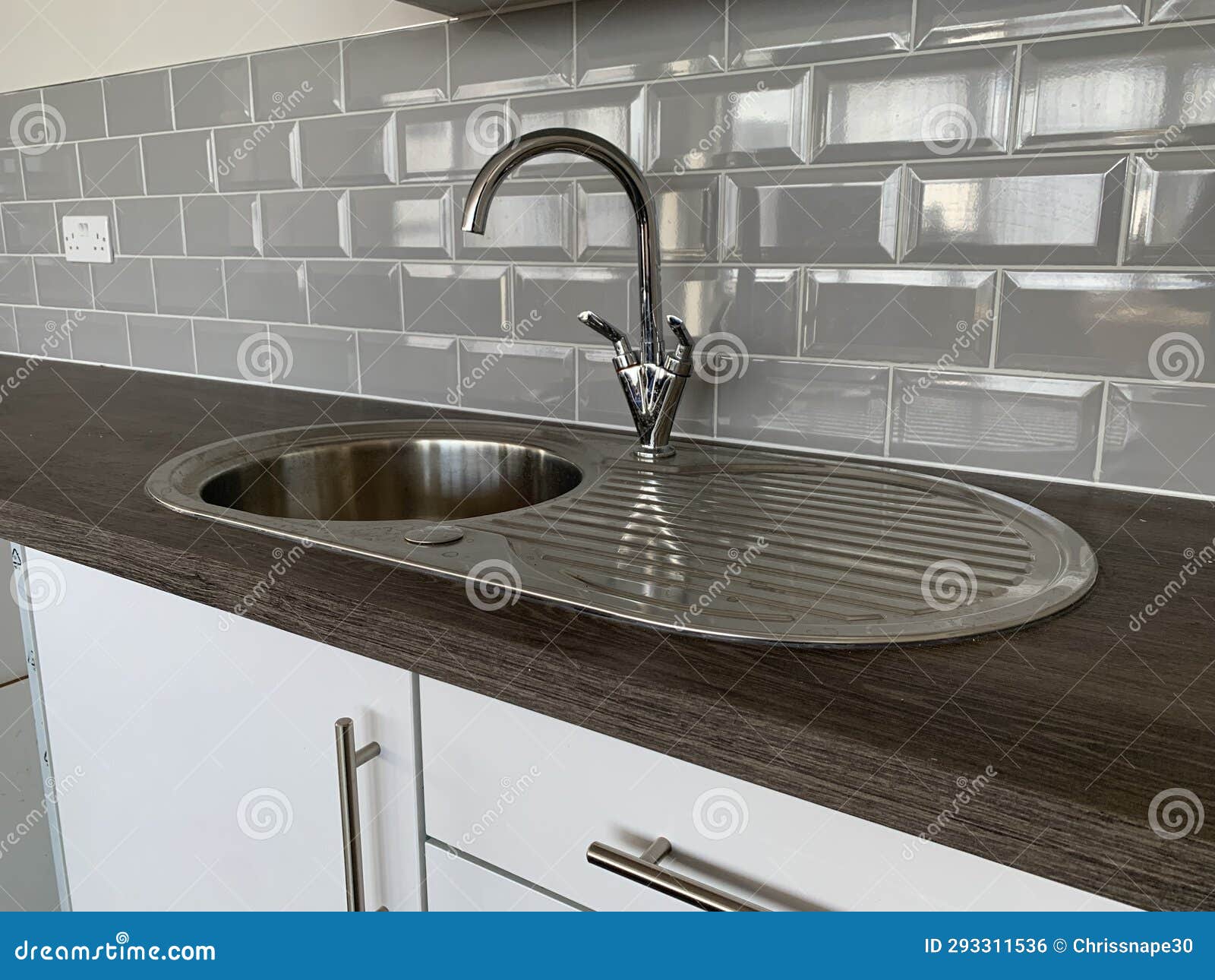Picture of a Modern Metal Kitchen Office Sink and Countertop Stock ...