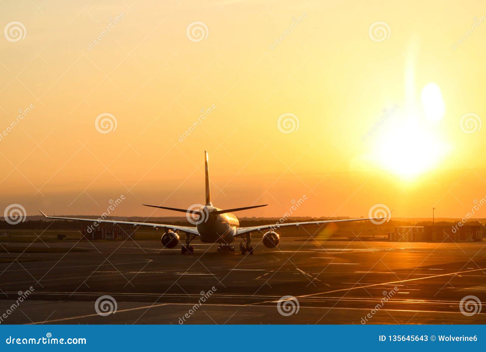 Plane Standing on the Side Runway Stock Image - Image of silhouette ...