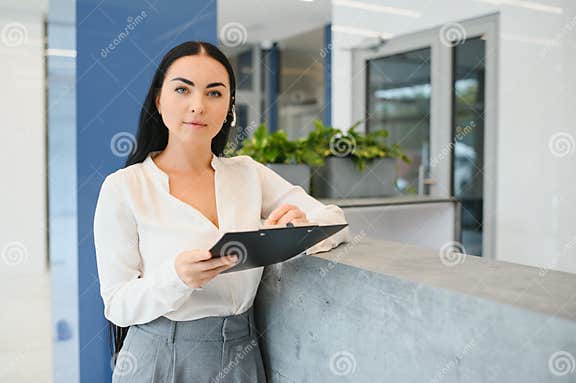 Picture of Pretty Receptionist at Work. Stock Image - Image of front ...