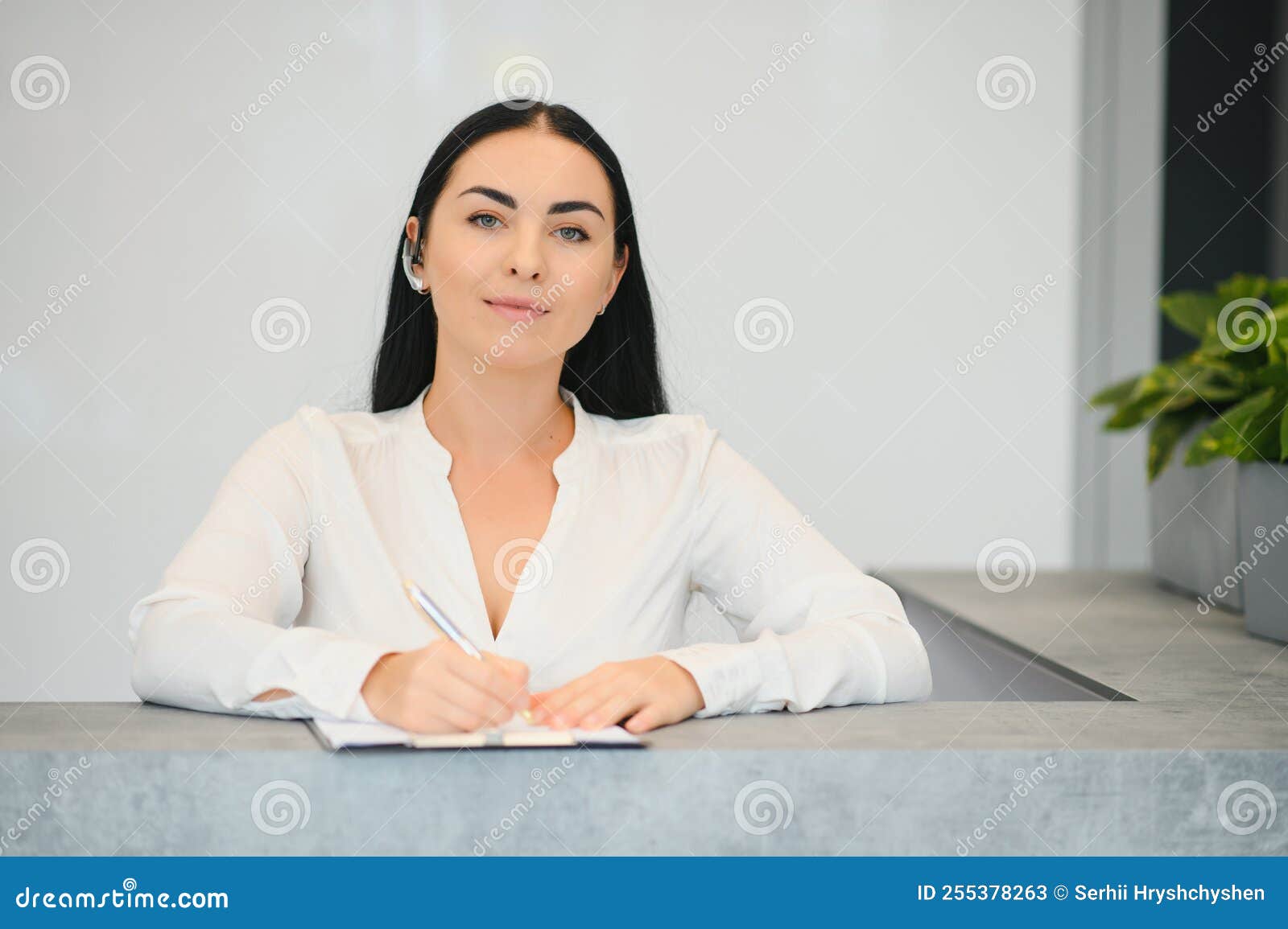 Picture of Pretty Receptionist at Work. Stock Image - Image of ...