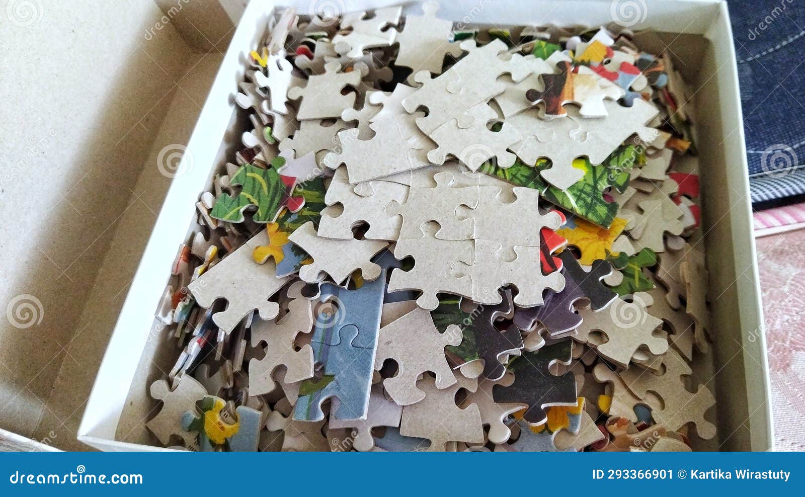 A Picture of Puzzle Pieces in Box Stock Image - Image of cardbox, hard ...