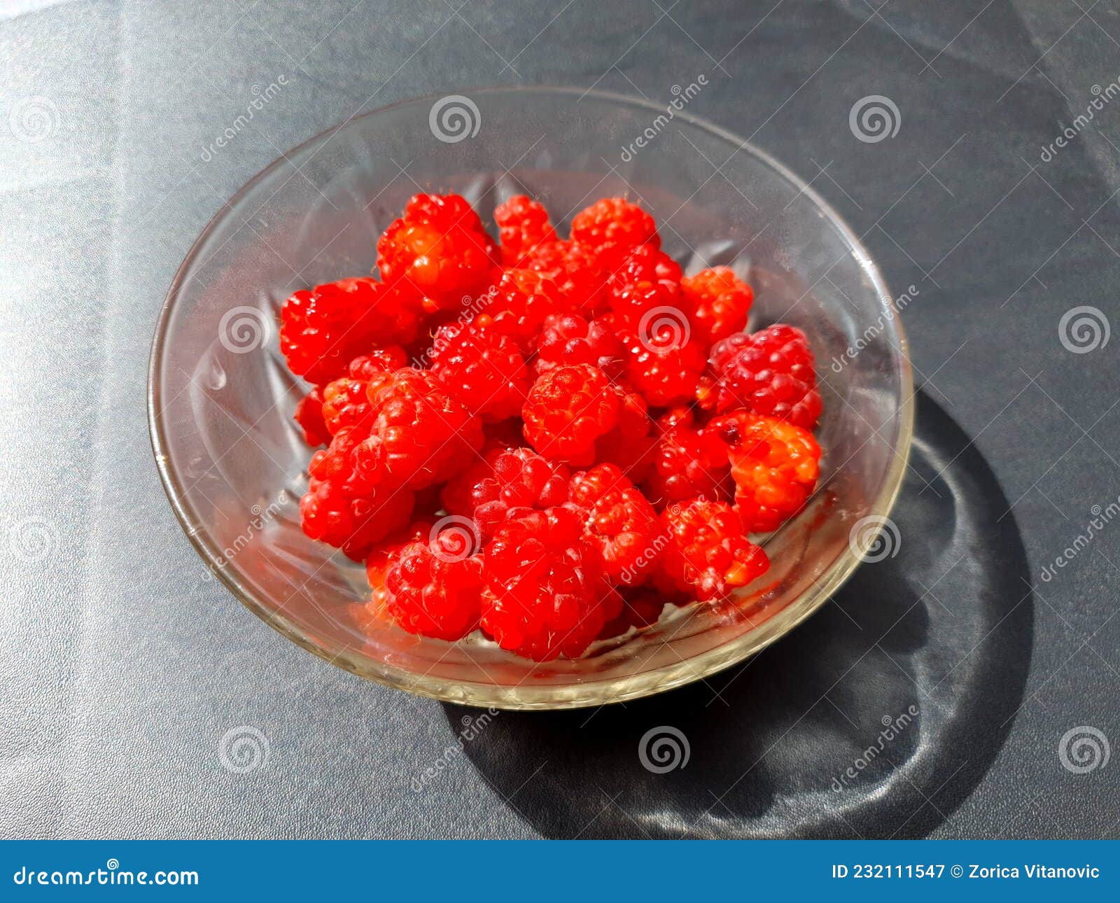 Raspberry in glass bowl stock image. Image of meal, strawberry - 232111547