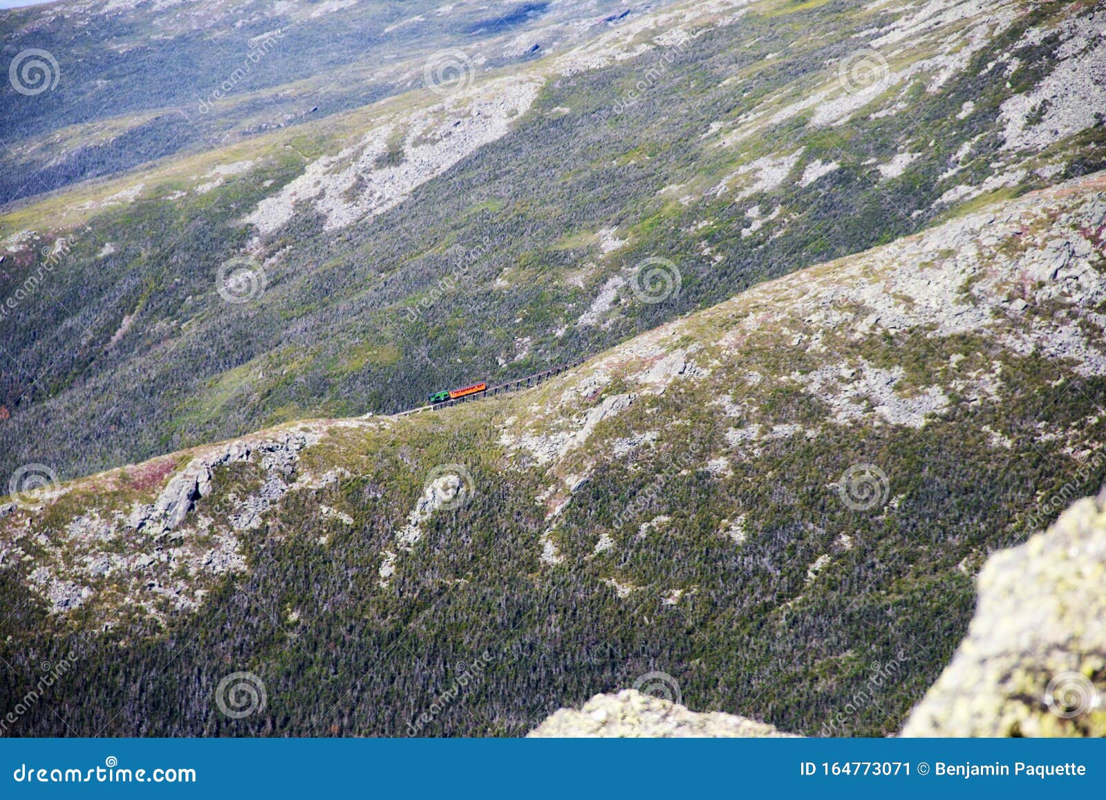 Red Train Going Up the Side of a Mountain Stock Image - Image of ...