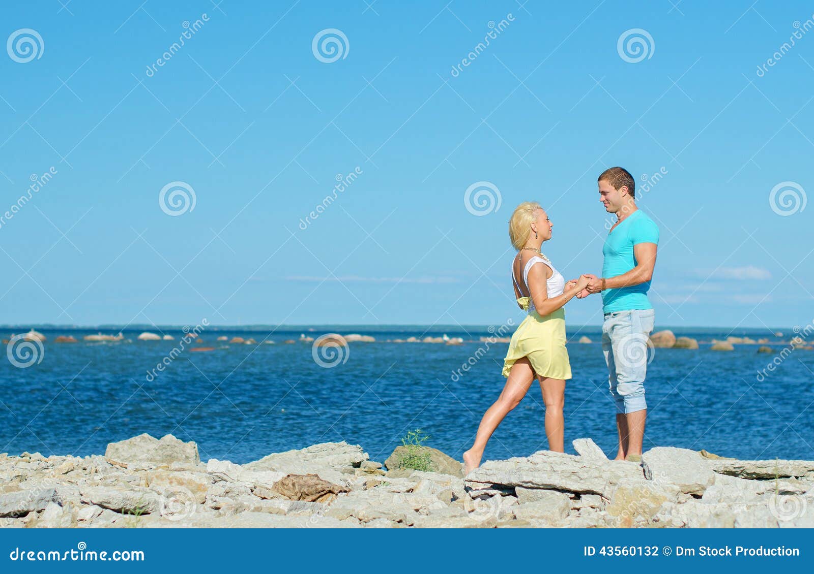 Picture of Romantic Young Couple by the Sea. Stock Photo - Image of ...