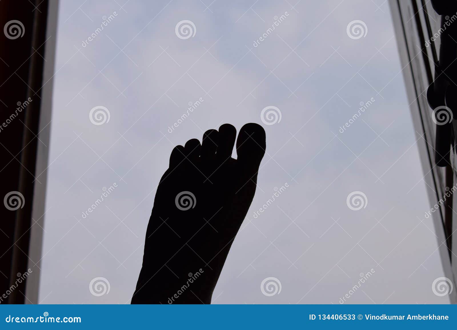 Shadow of a bare foot stock image. Image of seashore - 134406533