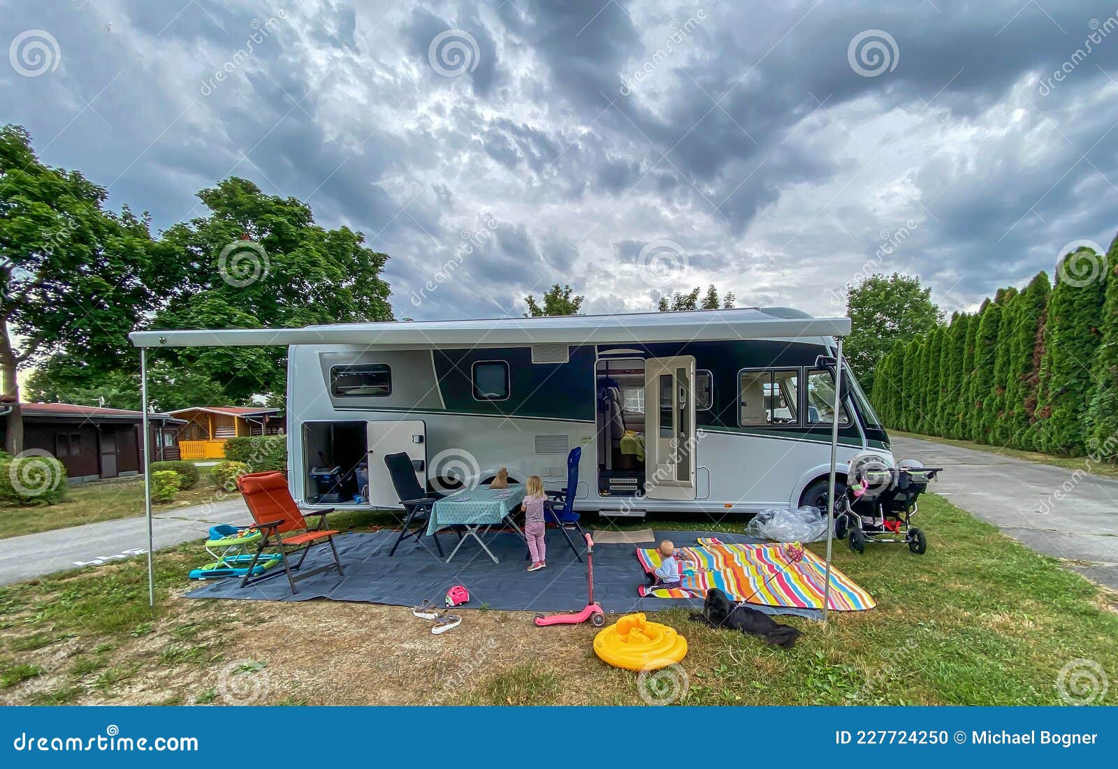 Caravan / Camper at a Campside in the Evening Stock Photo - Image of ...