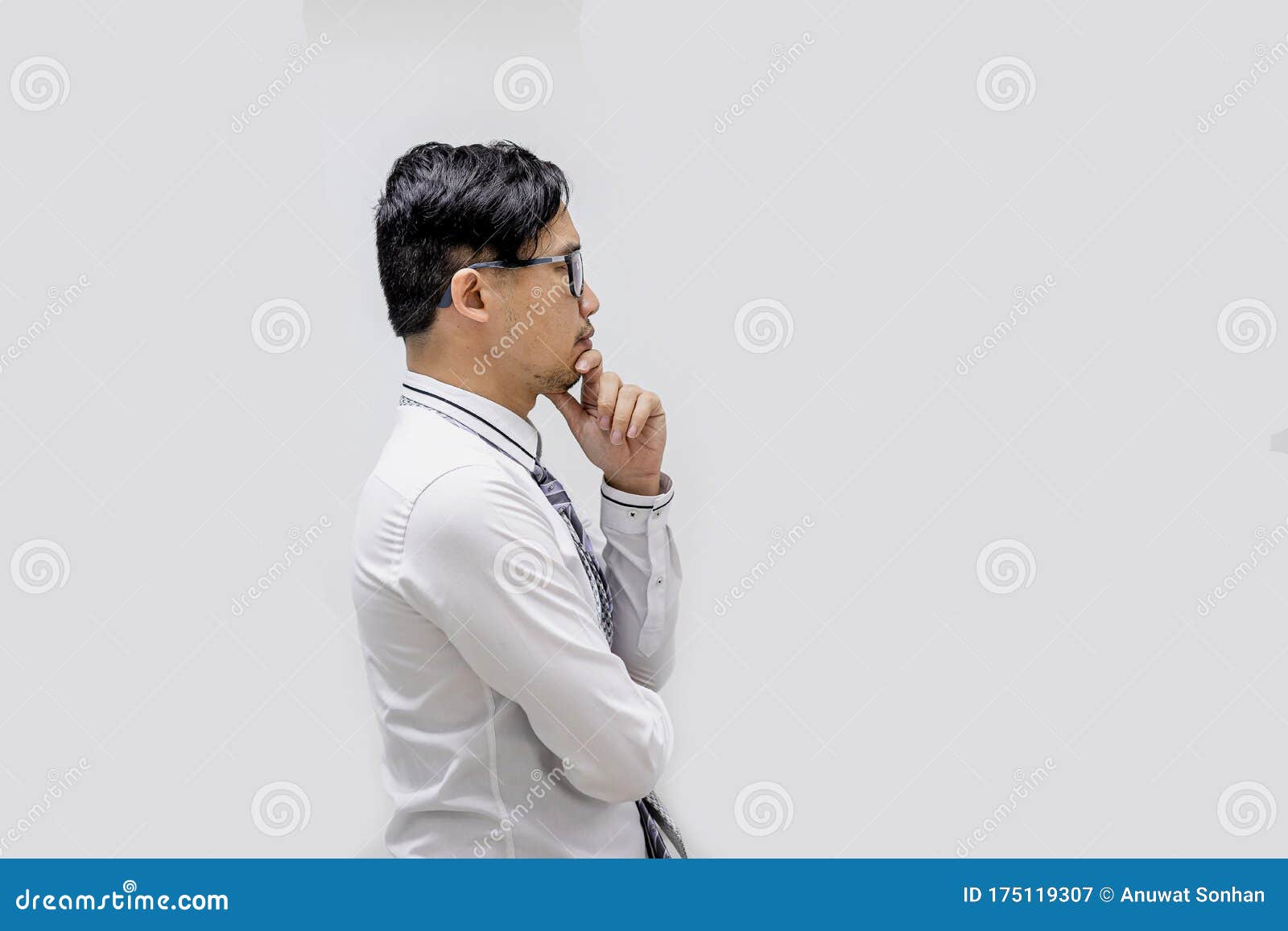 A Picture of the Side of a Business Man Who is Thinking Something Stock ...