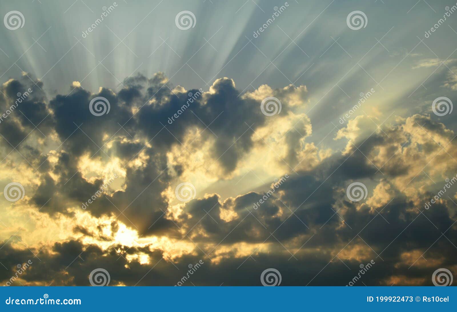 Dramatic Sky with Stormy Clouds, the Bright Yellow Sun Breaking through the Dark Stormy Clouds ...