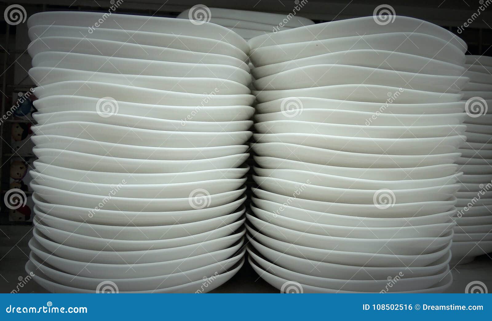 A stack of white plates stock photo. Image of plates - 108502516