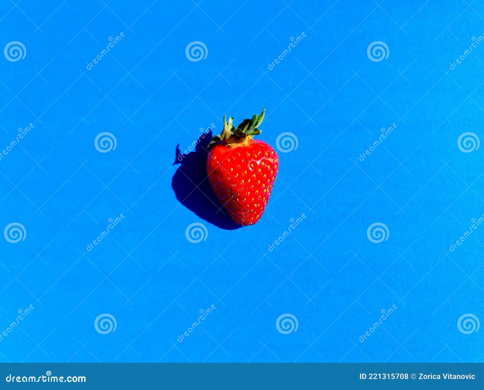 Strawberry with Shadow on Blue Background Stock Photo - Image of plant ...