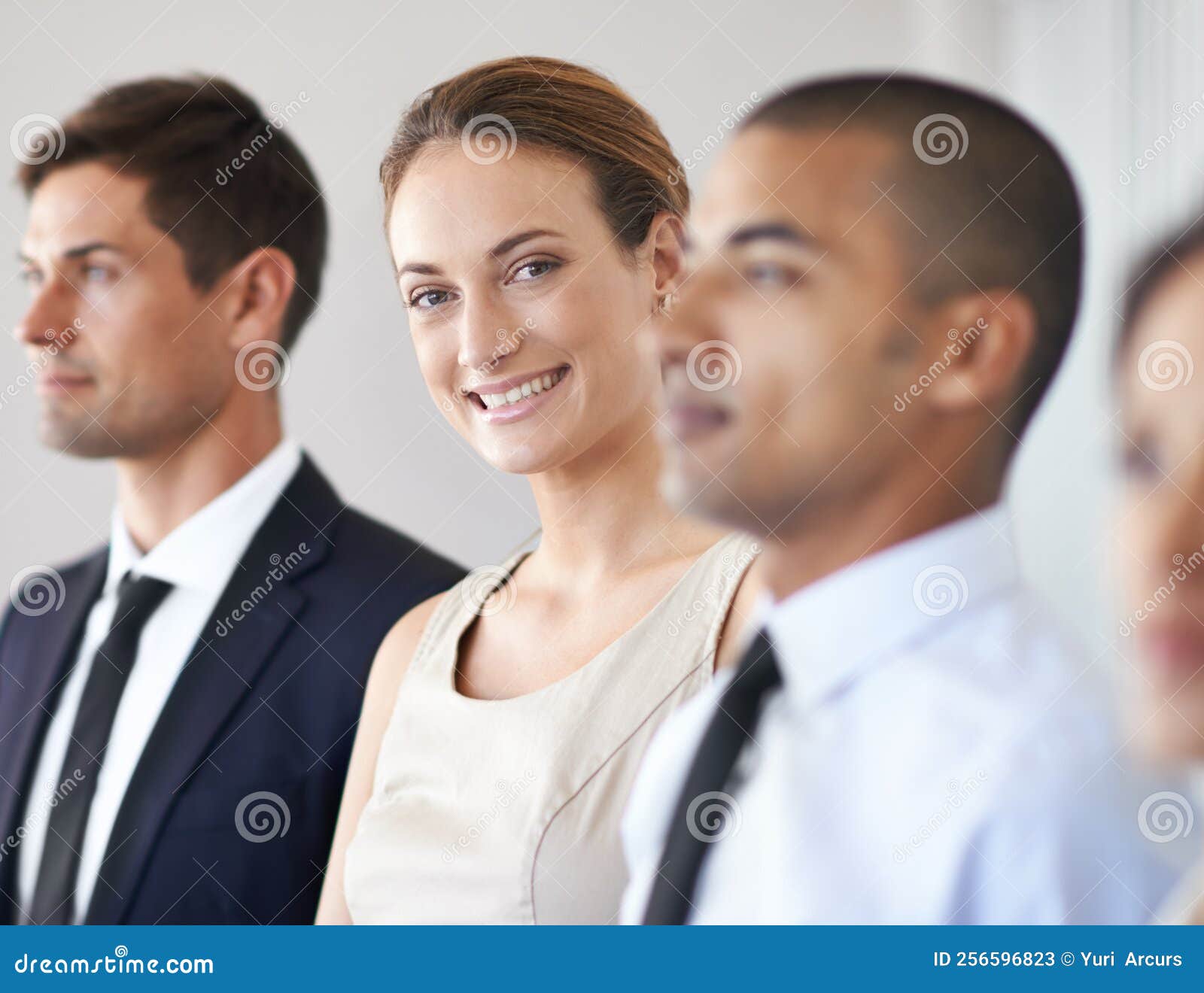 She is the Picture of Success. Portrait of a Small Group of Colleagues ...