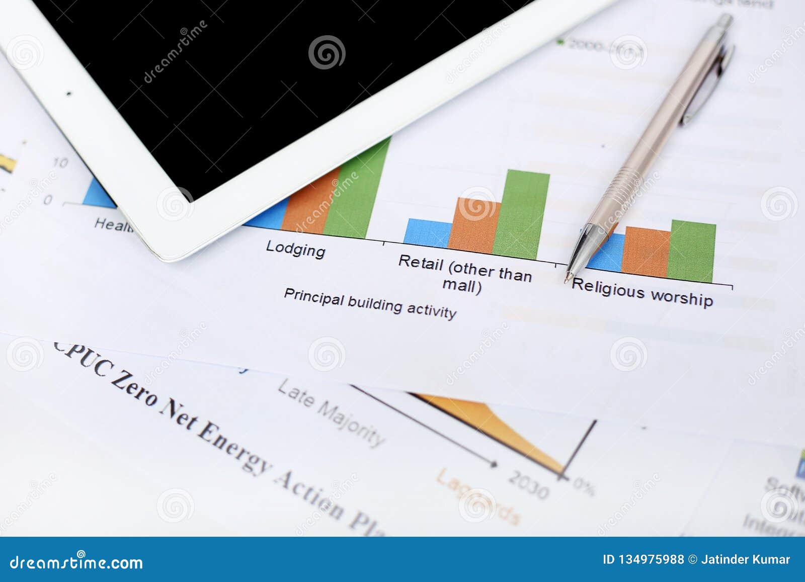 Picture of Tablet, Pen and Bar Graph Paper Stock Photo - Image of data ...