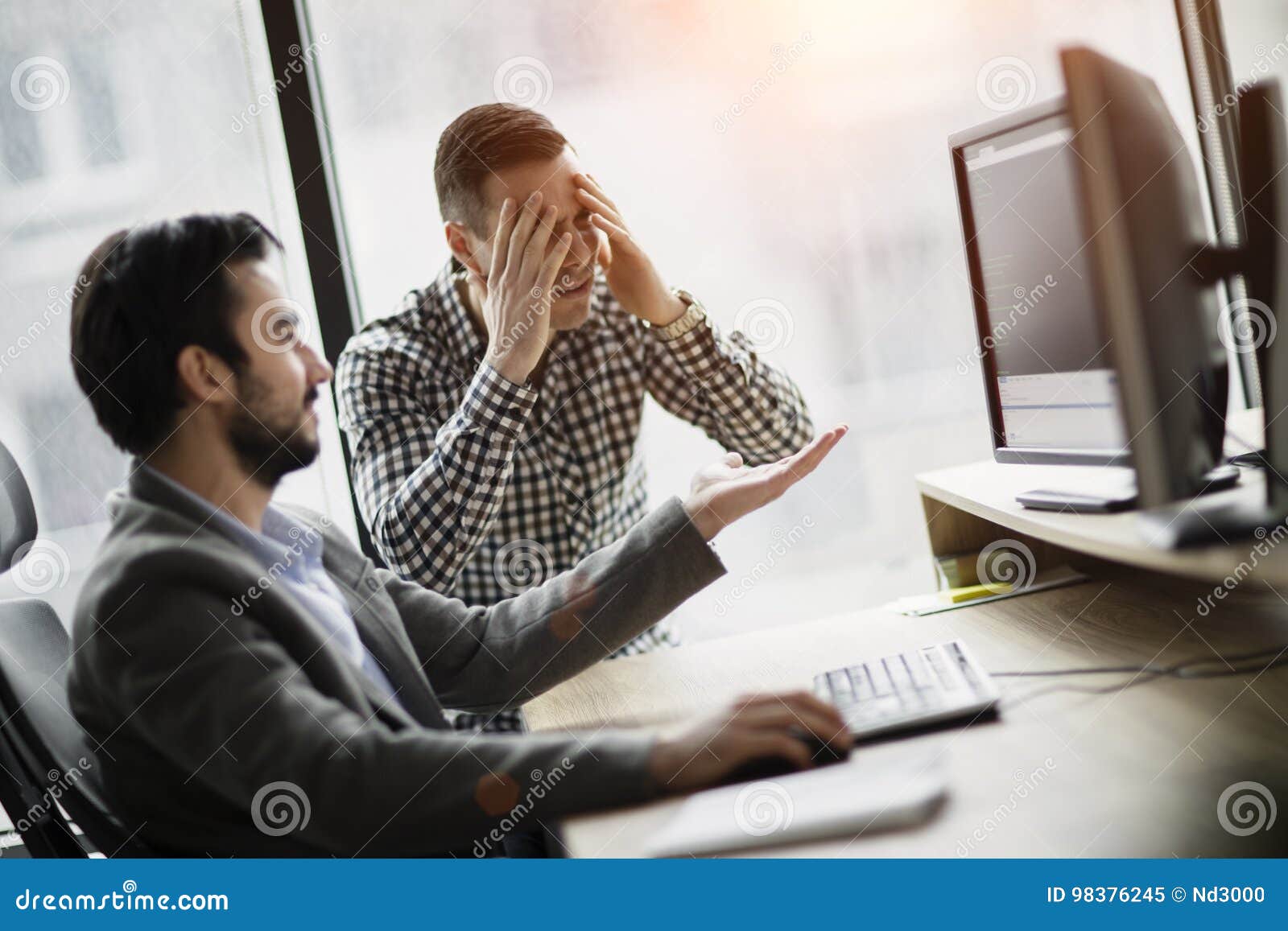 Picture of Two Businessmen Having Problems in Office Stock Image ...