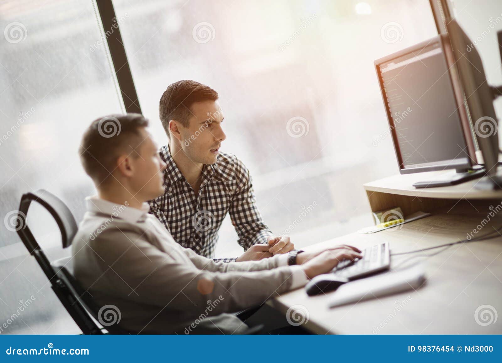 Picture of Two Businessmen Working on Computer Stock Photo - Image of ...
