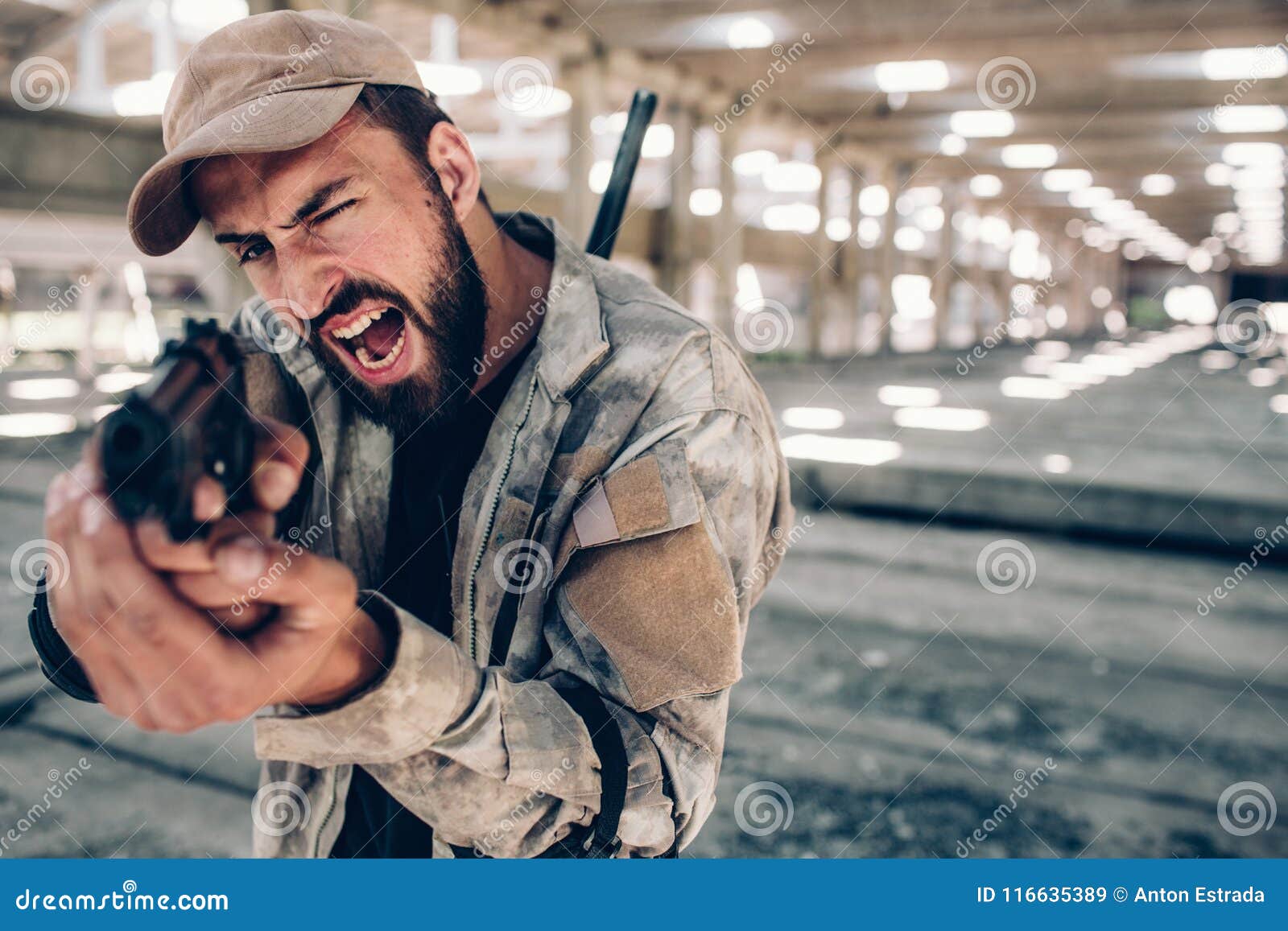 A Picture of Warrior Screaming and Yelling. he is Taking Aim by Using ...