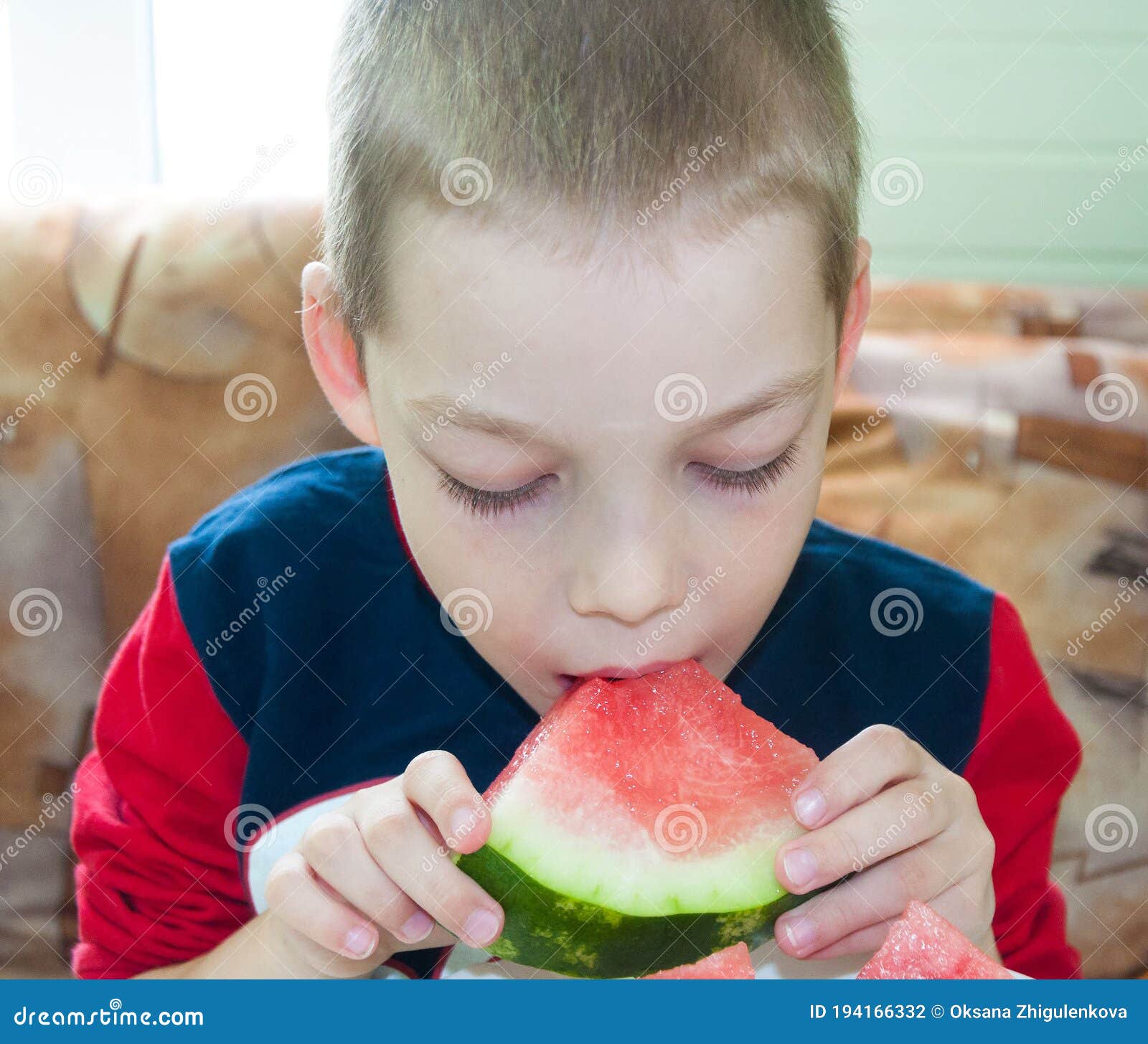 Picture of Young Boy and a Slice of Watermelon with Big Bite Marks ...