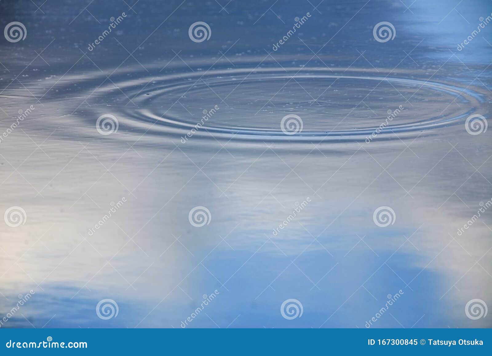 Blue Sky Reflected on the Surface of the Water with the Ripple Stock ...