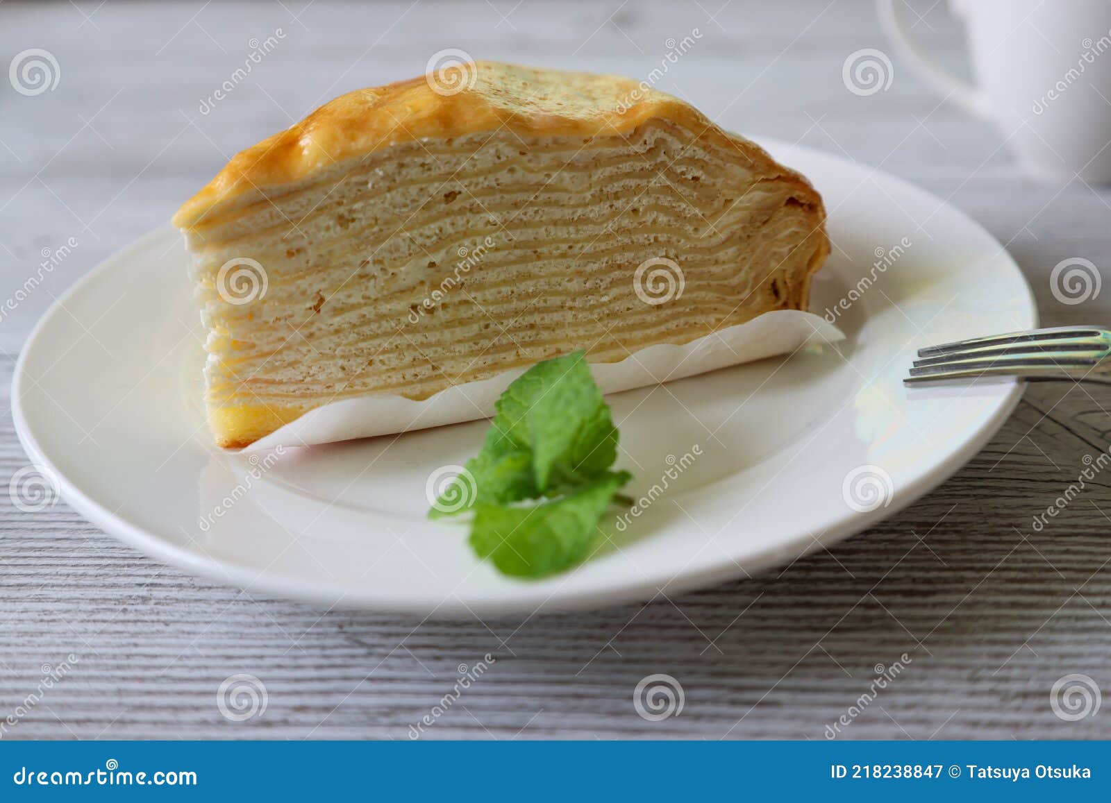 Mille Crepe Pieces of Mille Crepe in a Wooden Background Stock Image ...