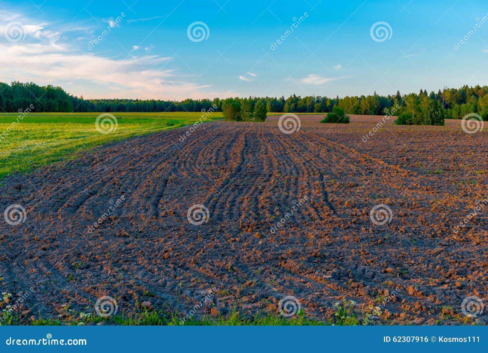 Picturesque Plowed Field at Sunset in the Spring Stock Photo - Image of ...