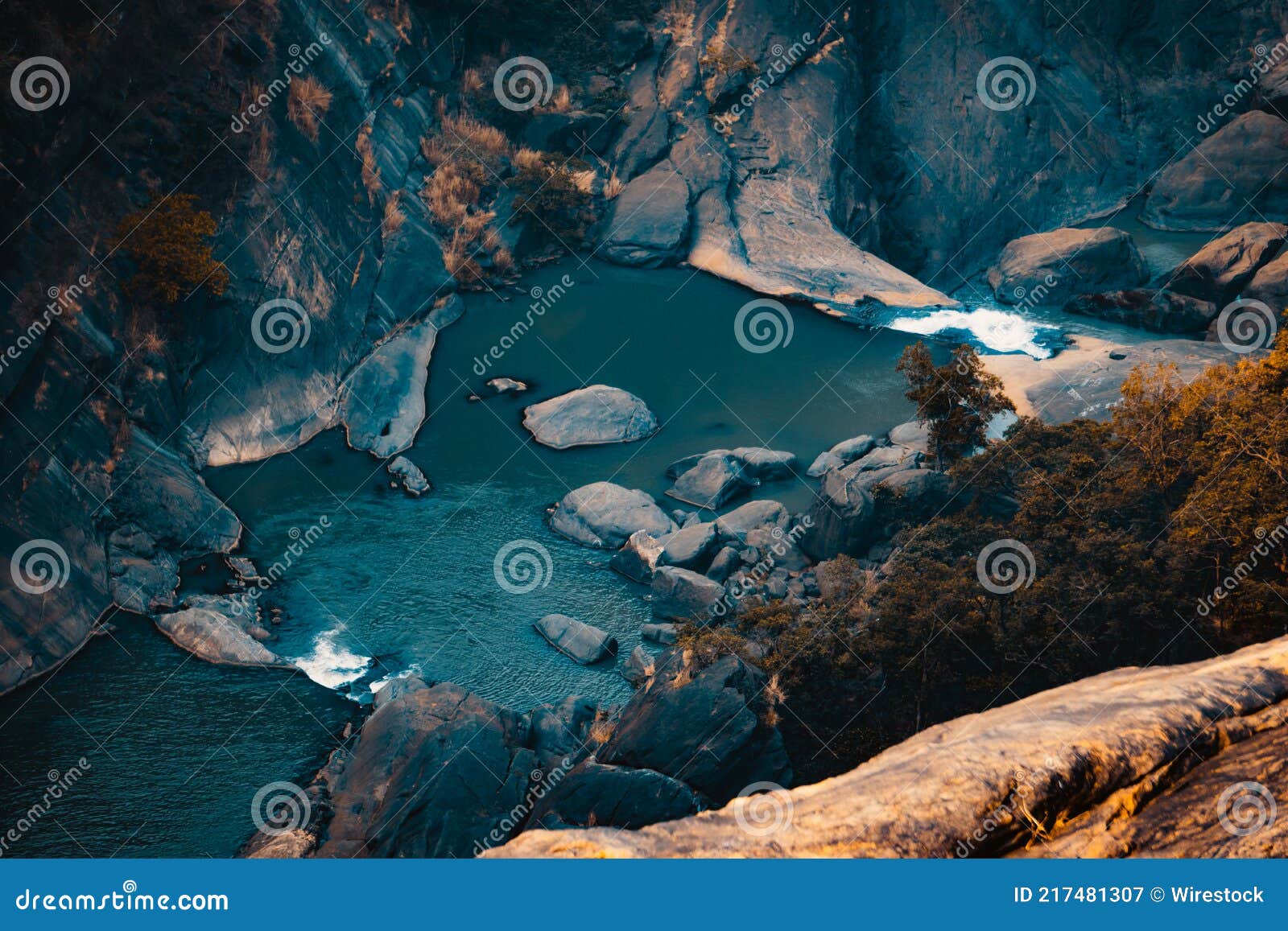 Picturesque Scenery of the Blue Water of the River on the Rocks of a ...