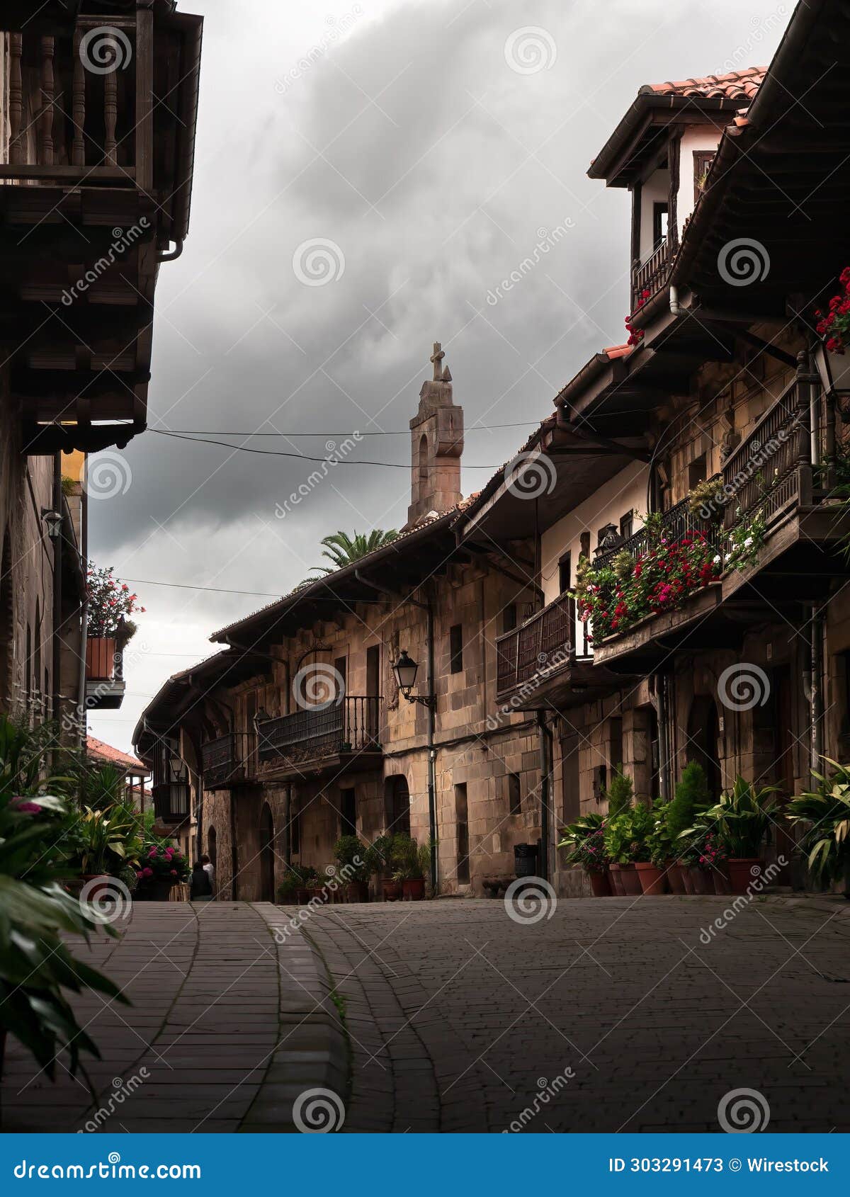 Picturesque Town Square Featuring a Classic Clock Tower in Cantabria ...