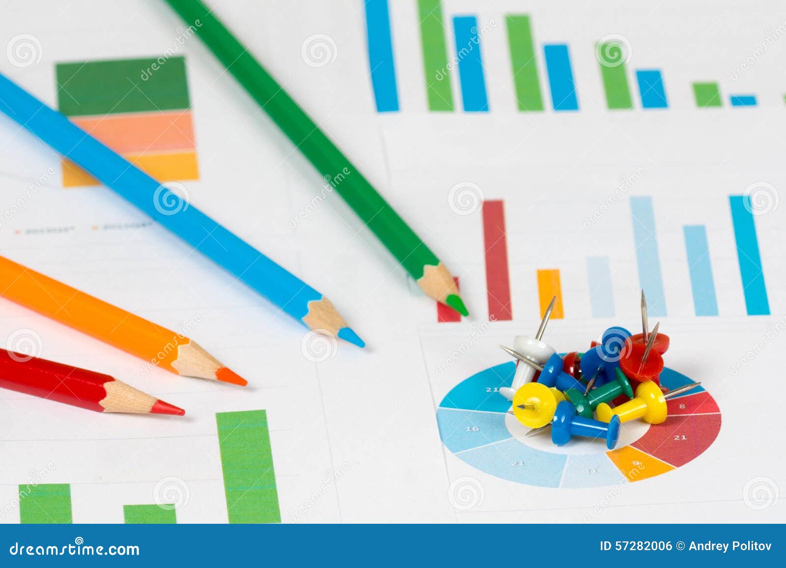 Pie and Bar Charts with Pencils and Pins Stock Photo - Image of blue ...