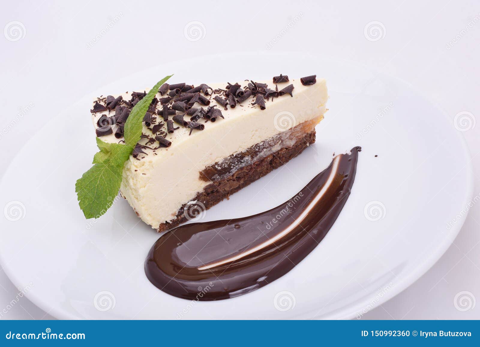 Piece of Appetizing Cheesecake with Chocolate Chips on a White Plate ...