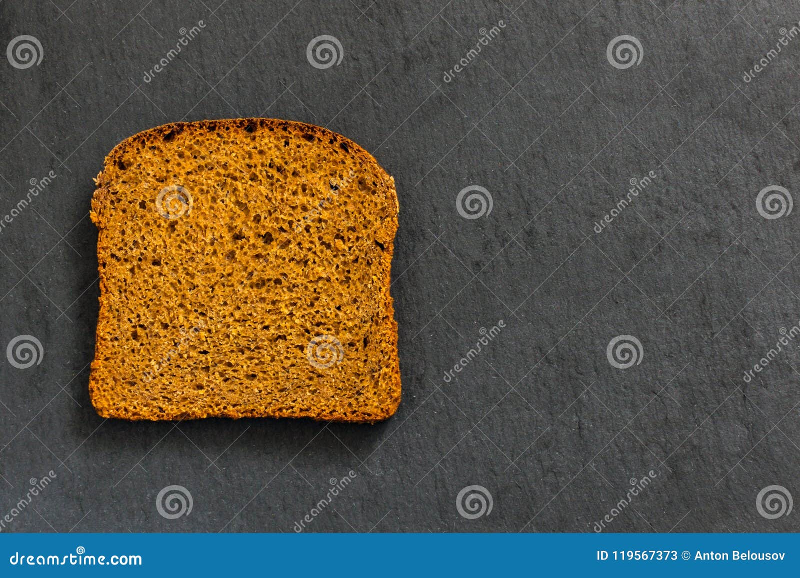 A Piece of Black Rye Bread on a Black Background Stock Image - Image of ...