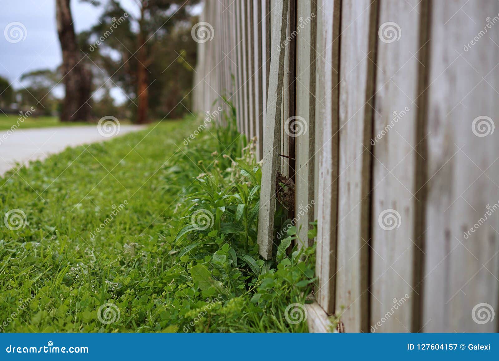 A Piece of Broken Wooden Fence Stock Image - Image of meadow, brown ...
