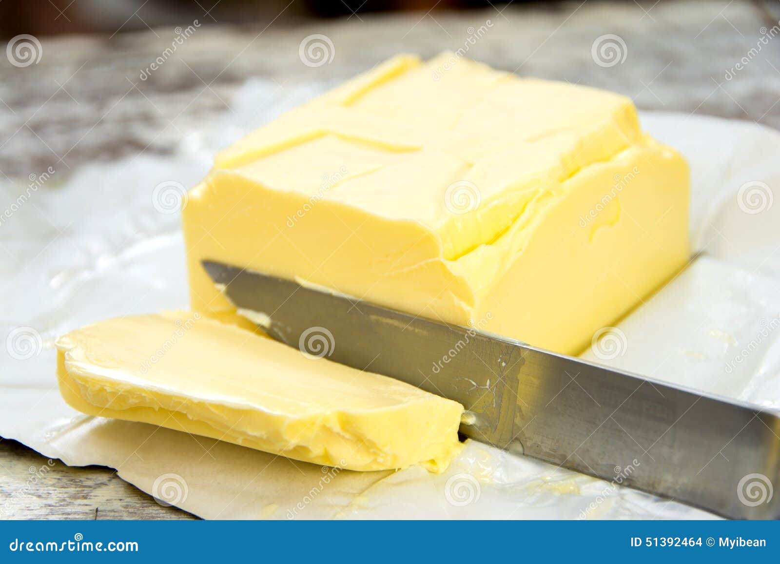 Piece of butter on paper stock photo. Image of shot, condition - 51392464
