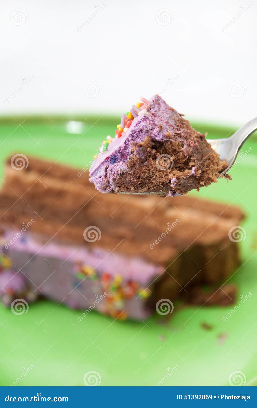 Piece of Cake on a Fork in Focus Stock Image - Image of black ...